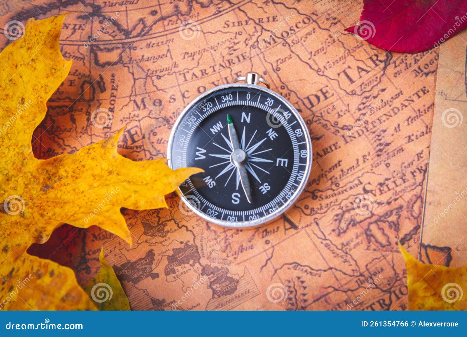 Traveler S Compass on Map in Bright Multi-colored Autumn Leaves ...