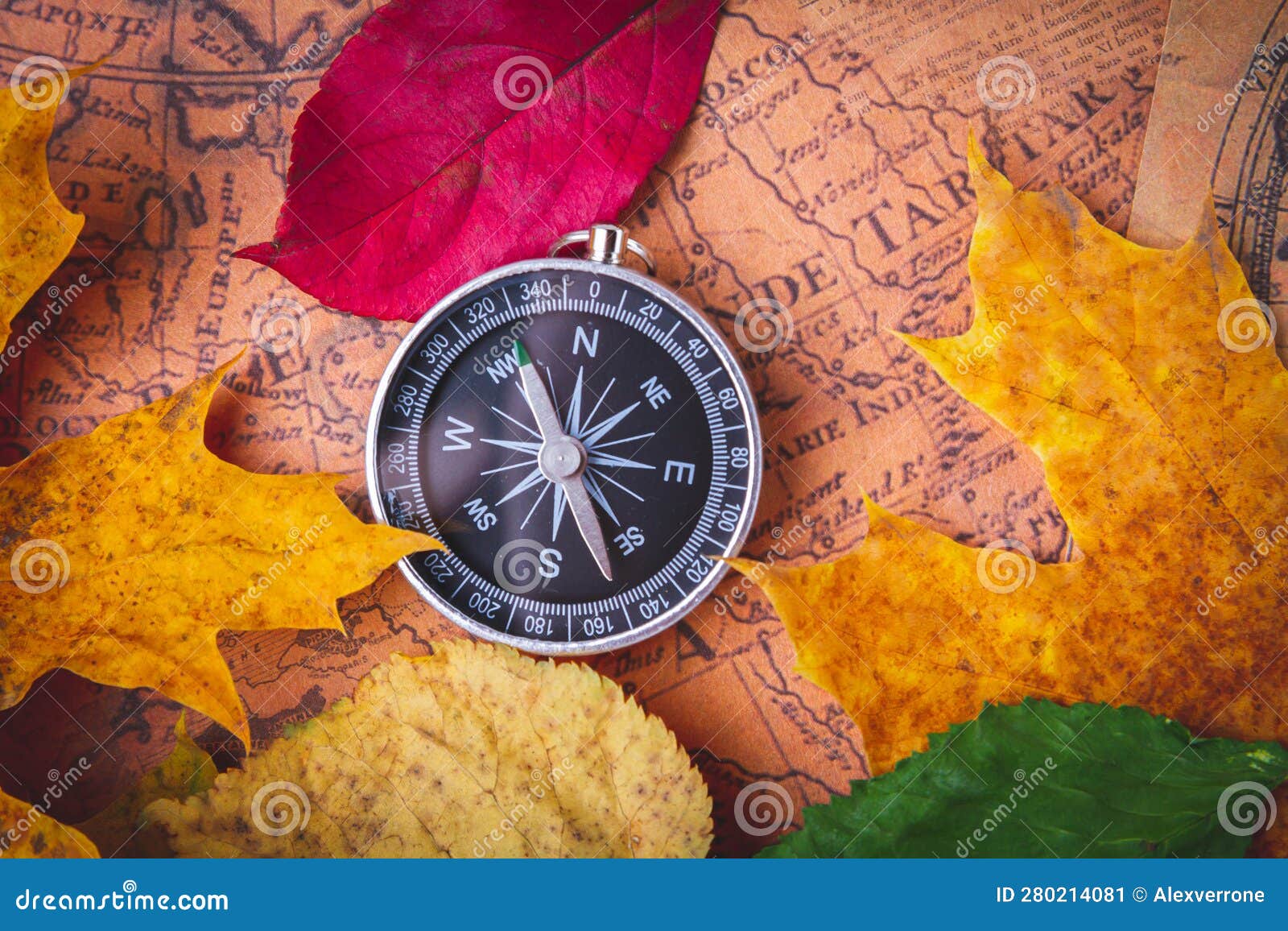 Traveler S Compass on Map in Bright Multi-colored Autumn Leaves ...