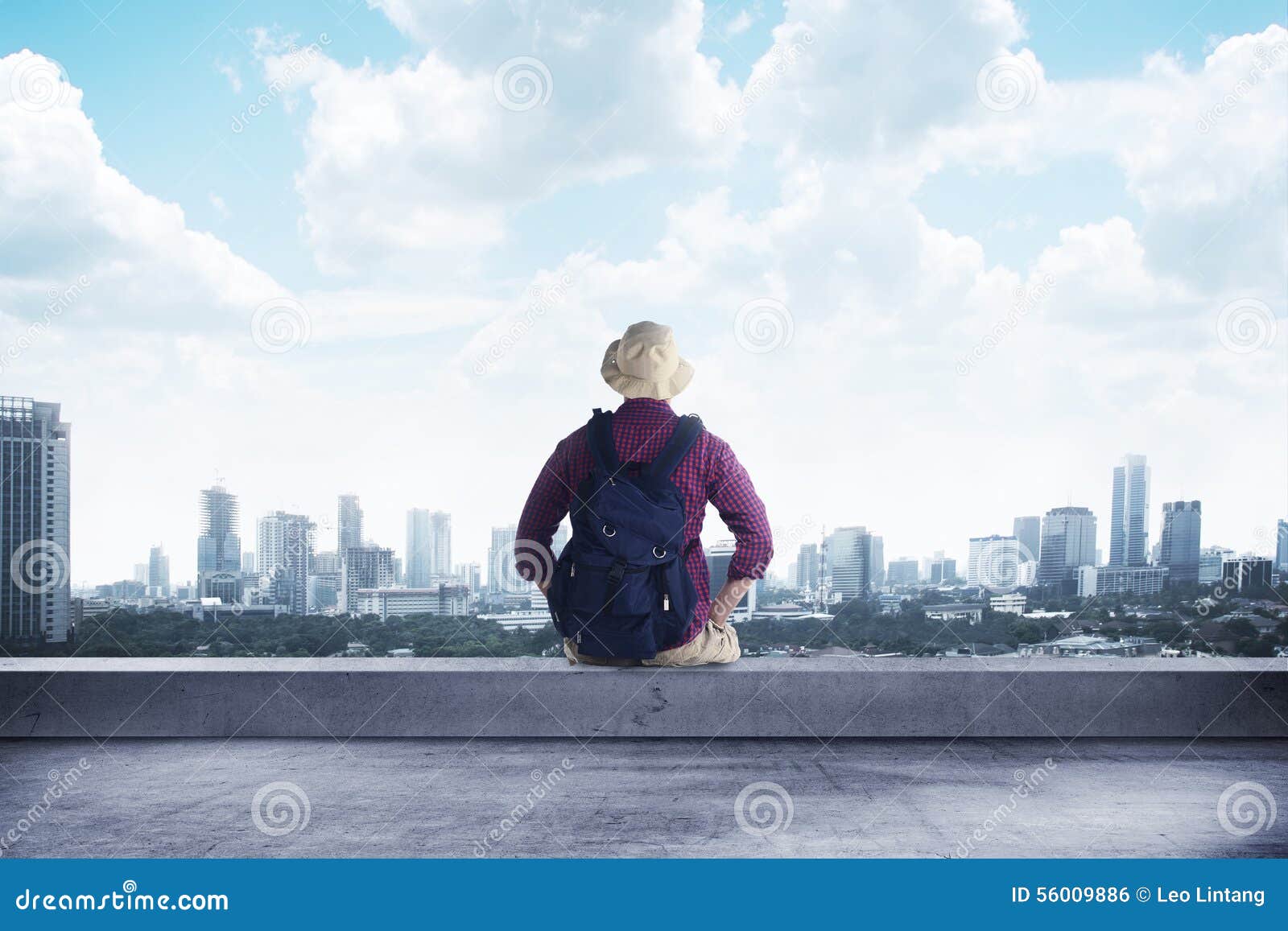 A Traveler Sitting on the Rooftop Stock Photo - Image of beautiful ...