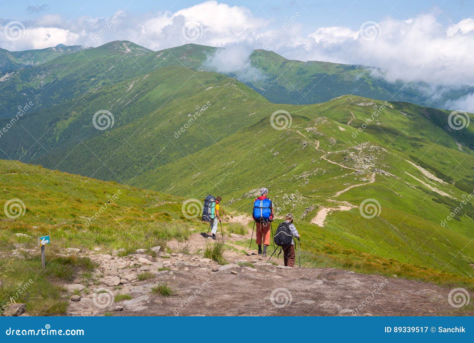 Travelers with Backpacks are Walking Down the Ridge Stock Image - Image ...