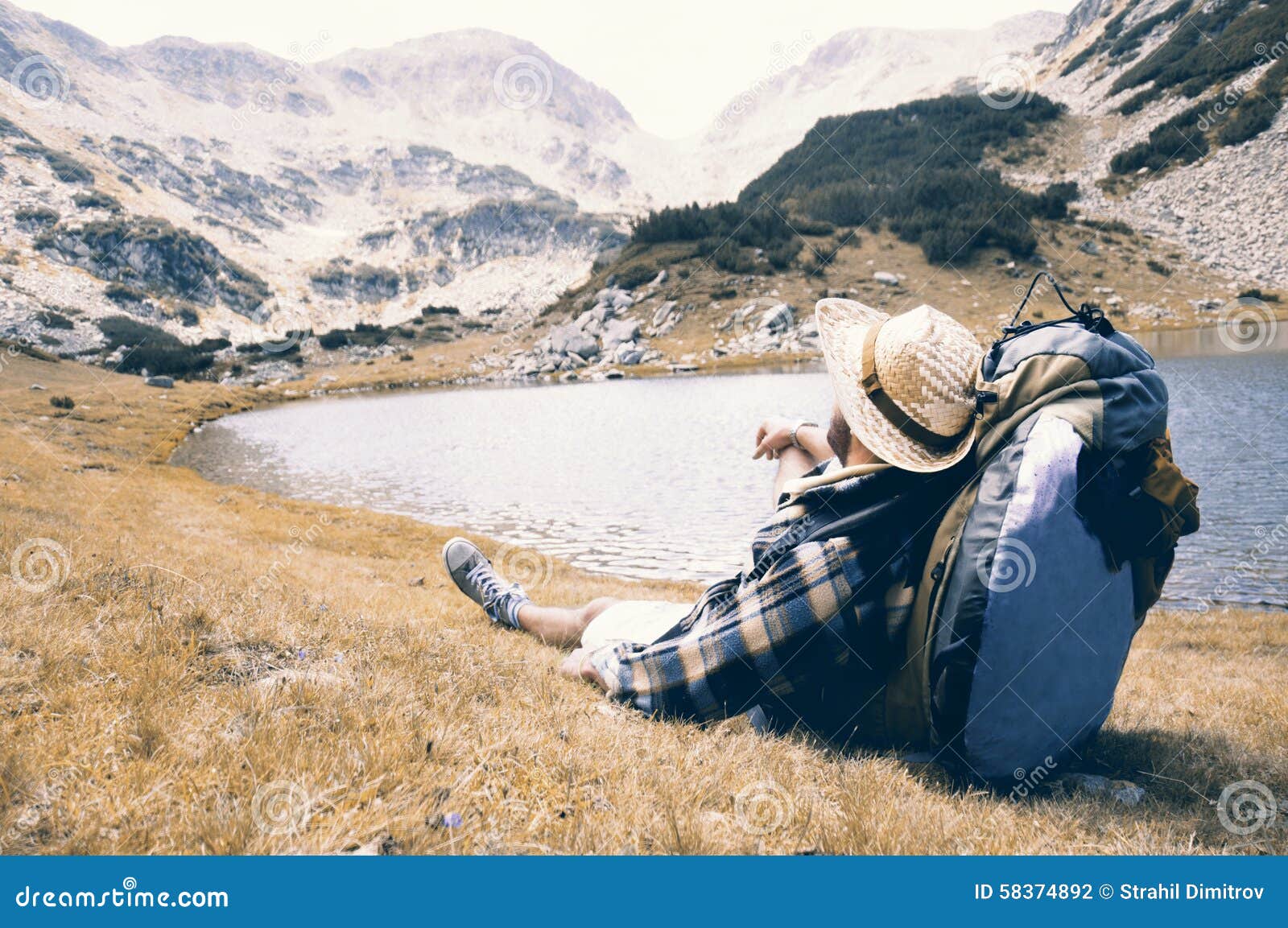 Traveller Enjoying the View and Relaxing at Mountain Site. Stock Photo ...