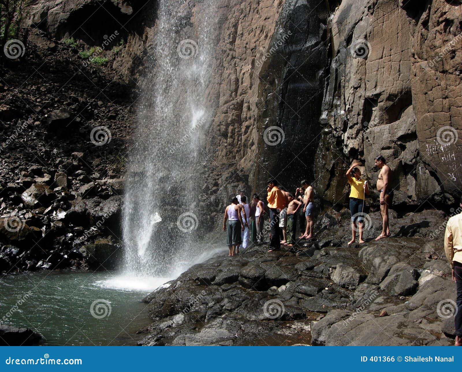 Travellers Enjoying Near Waterfall Stock Photo - Image of trip, travel ...