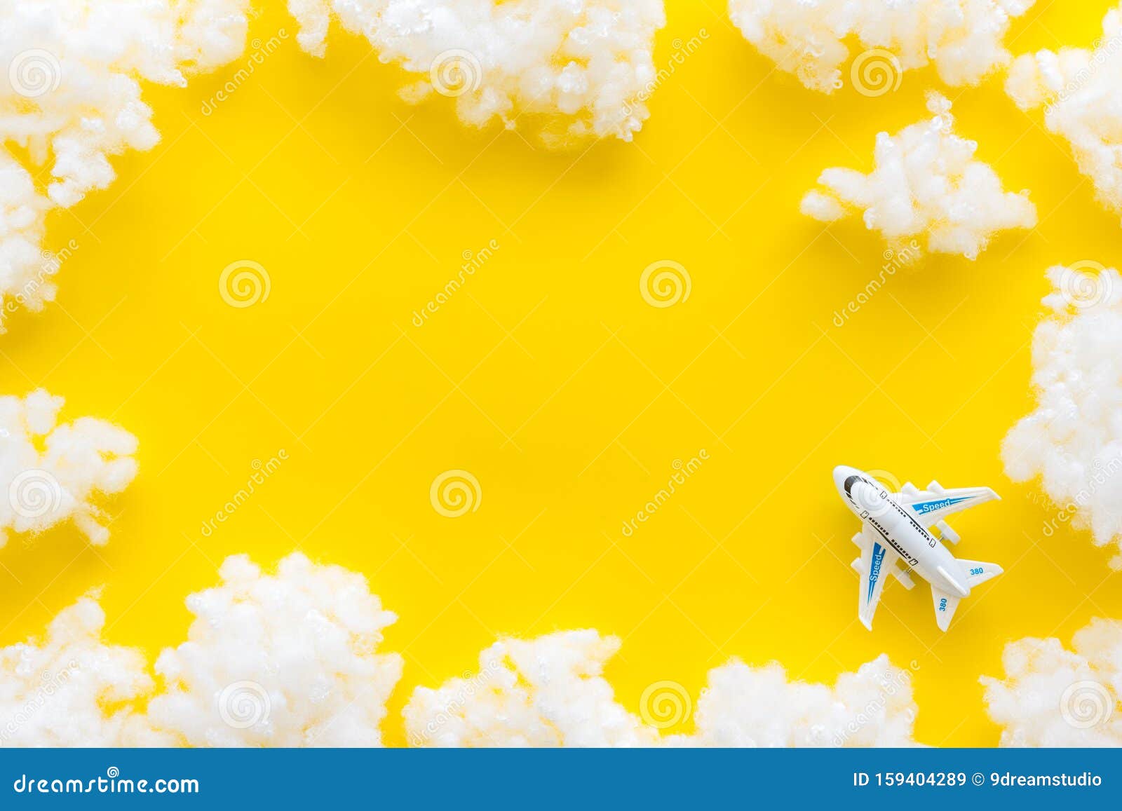 Fly by Plane Concept. Airplane Model and Clouds on Yellow Background ...