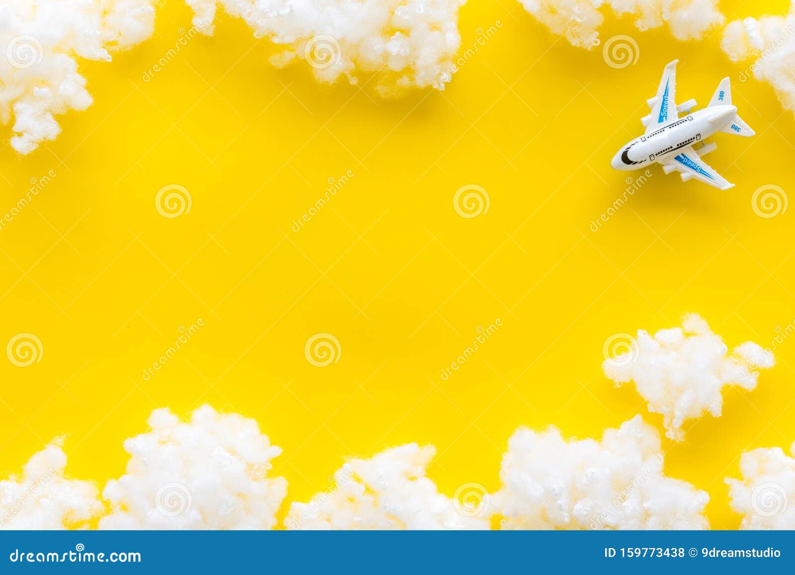Fly by Plane Concept. Airplane Model and Clouds on Yellow Background ...