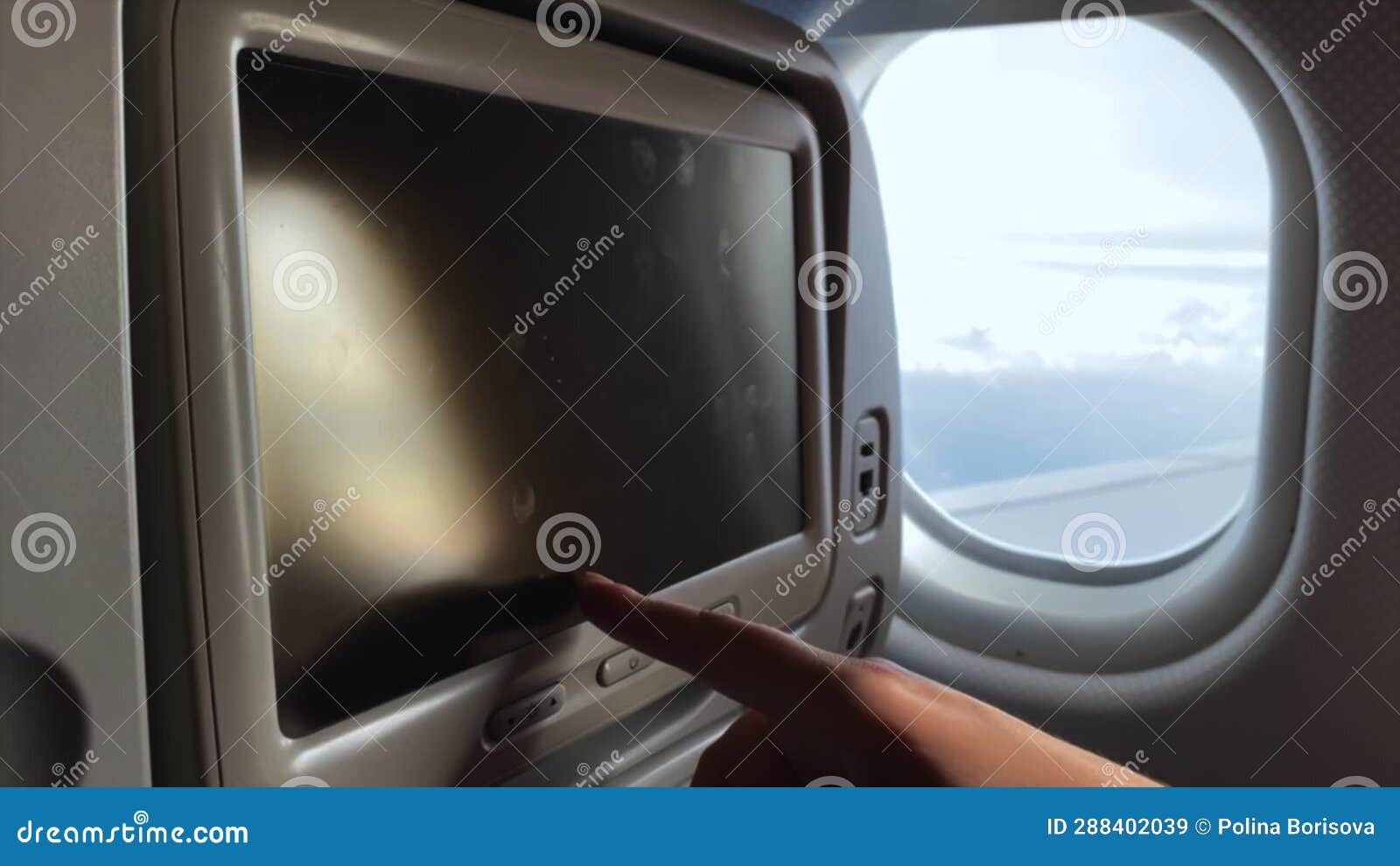 Travelling by Plane, Passenger of Business Class is Using Sensor Screen ...