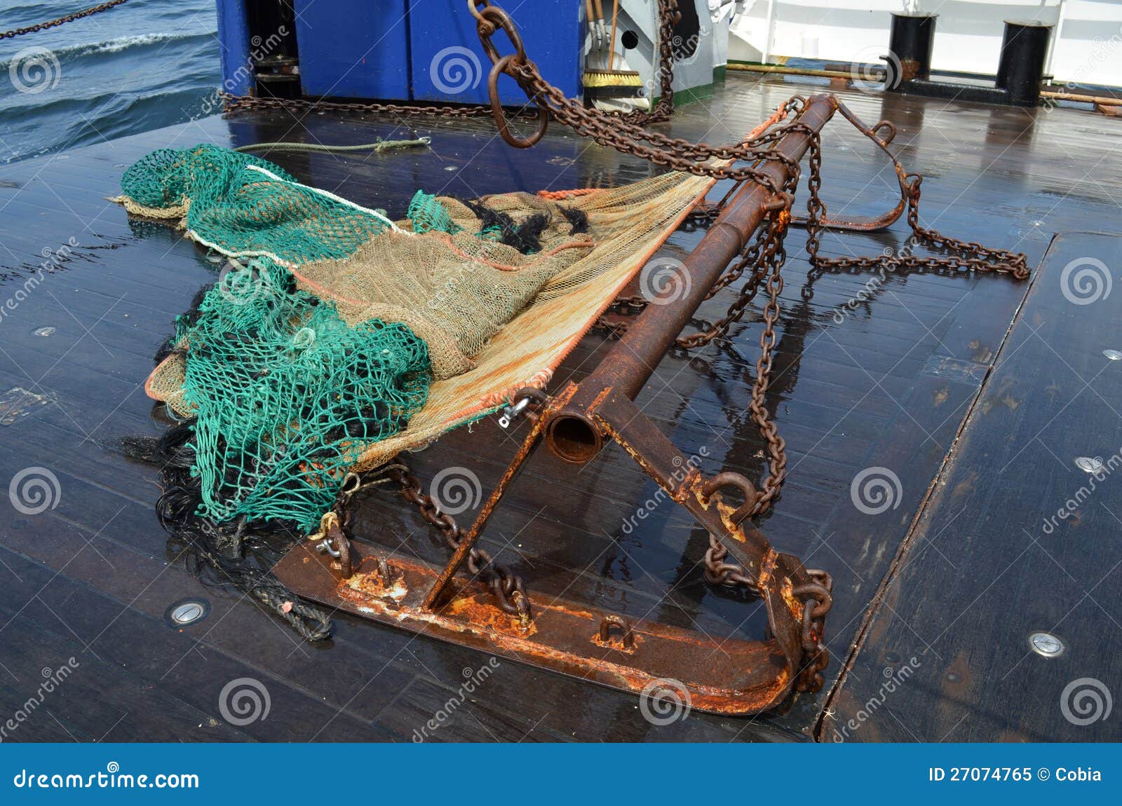 Trawl Net and Dredge on Deck of a Fishing Vessel Stock Image - Image of ...