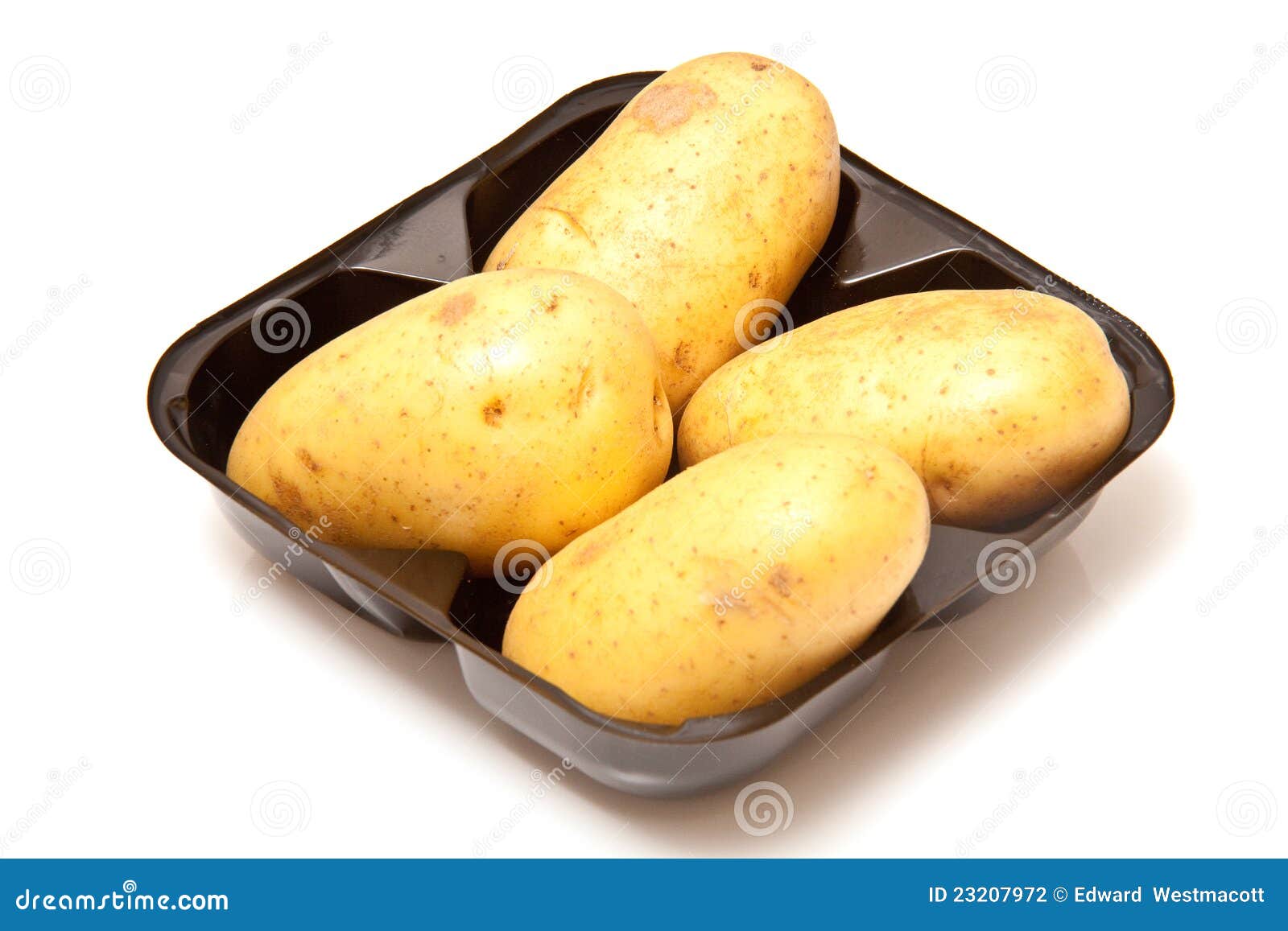 Tray of baking potatoes stock photo. Image of carbohydrates - 23207972