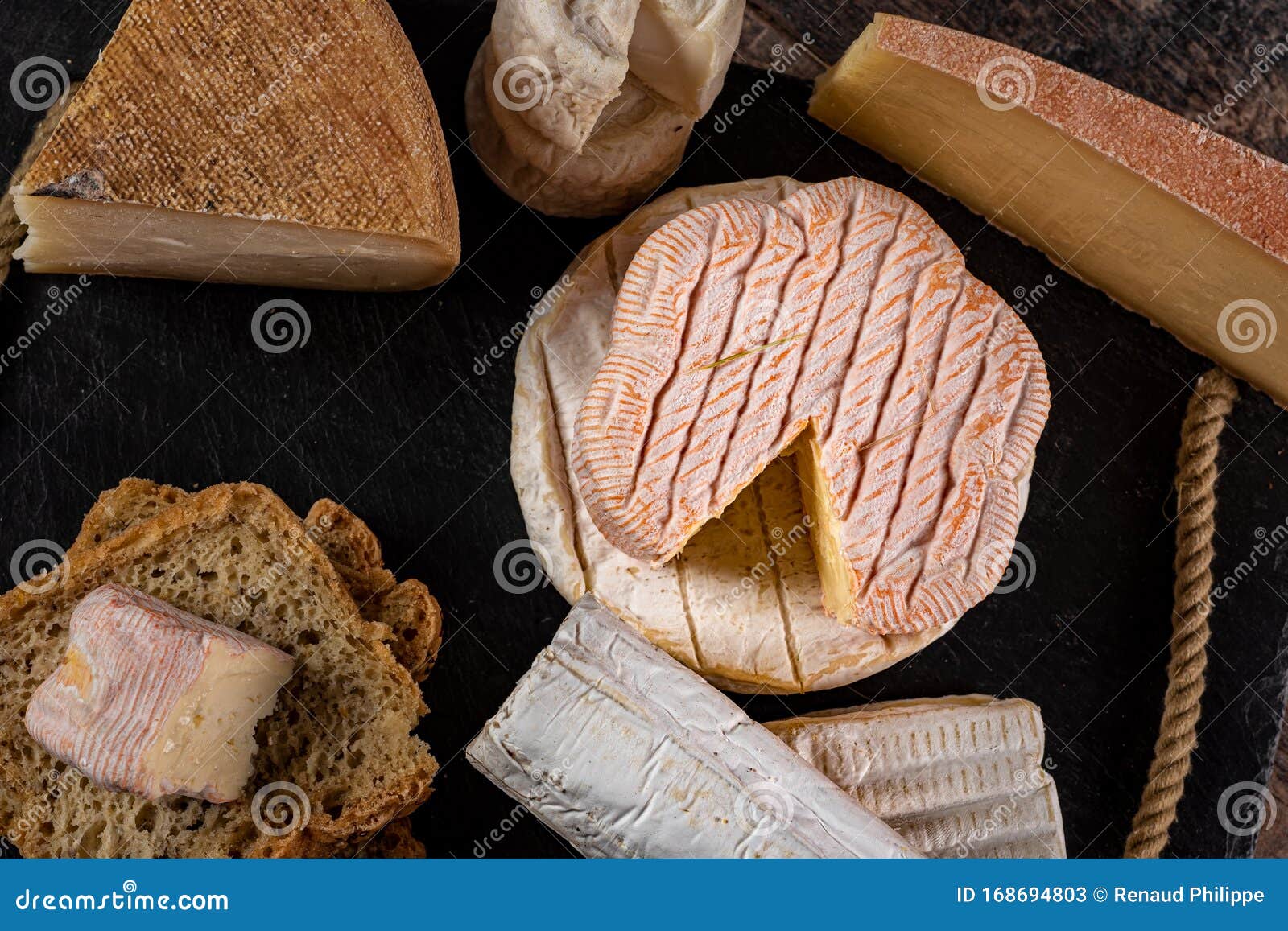 Different French Cheeses With Bread And Apricots Royalty-Free Stock ...