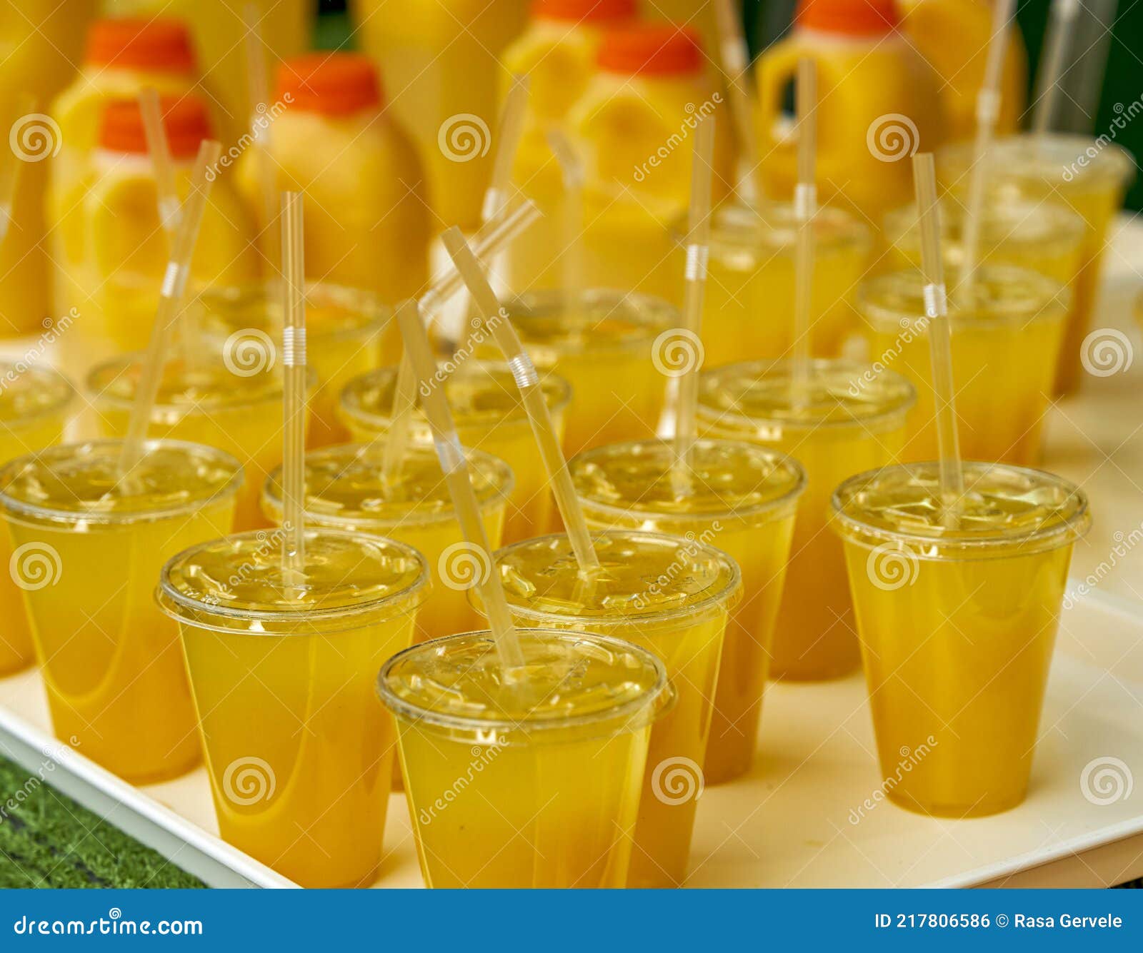 Tray with Fresh Squeezed Juices in Plastic Cups with Straws Stock Photo ...