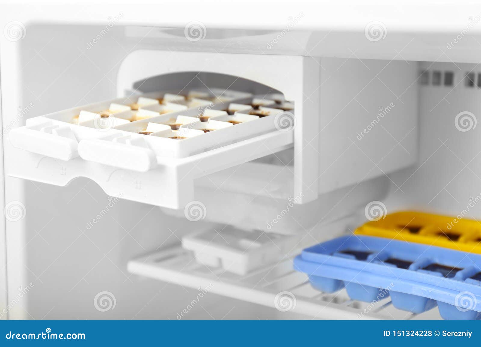 Trays with Coffee Ice Cubes in Fridge Stock Photo - Image of fresh ...
