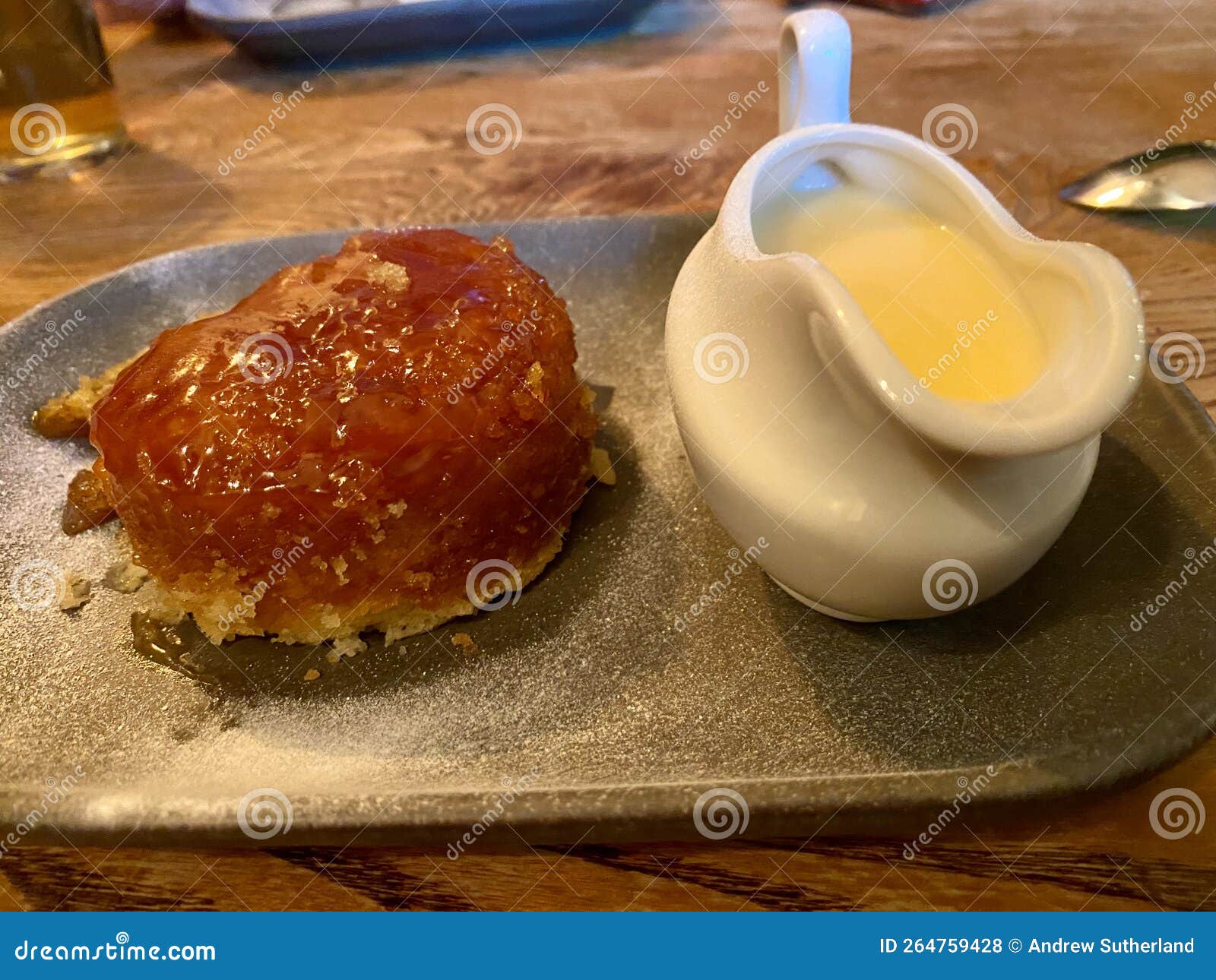 Treacle sponge and custard stock photo. Image of dish - 264759428
