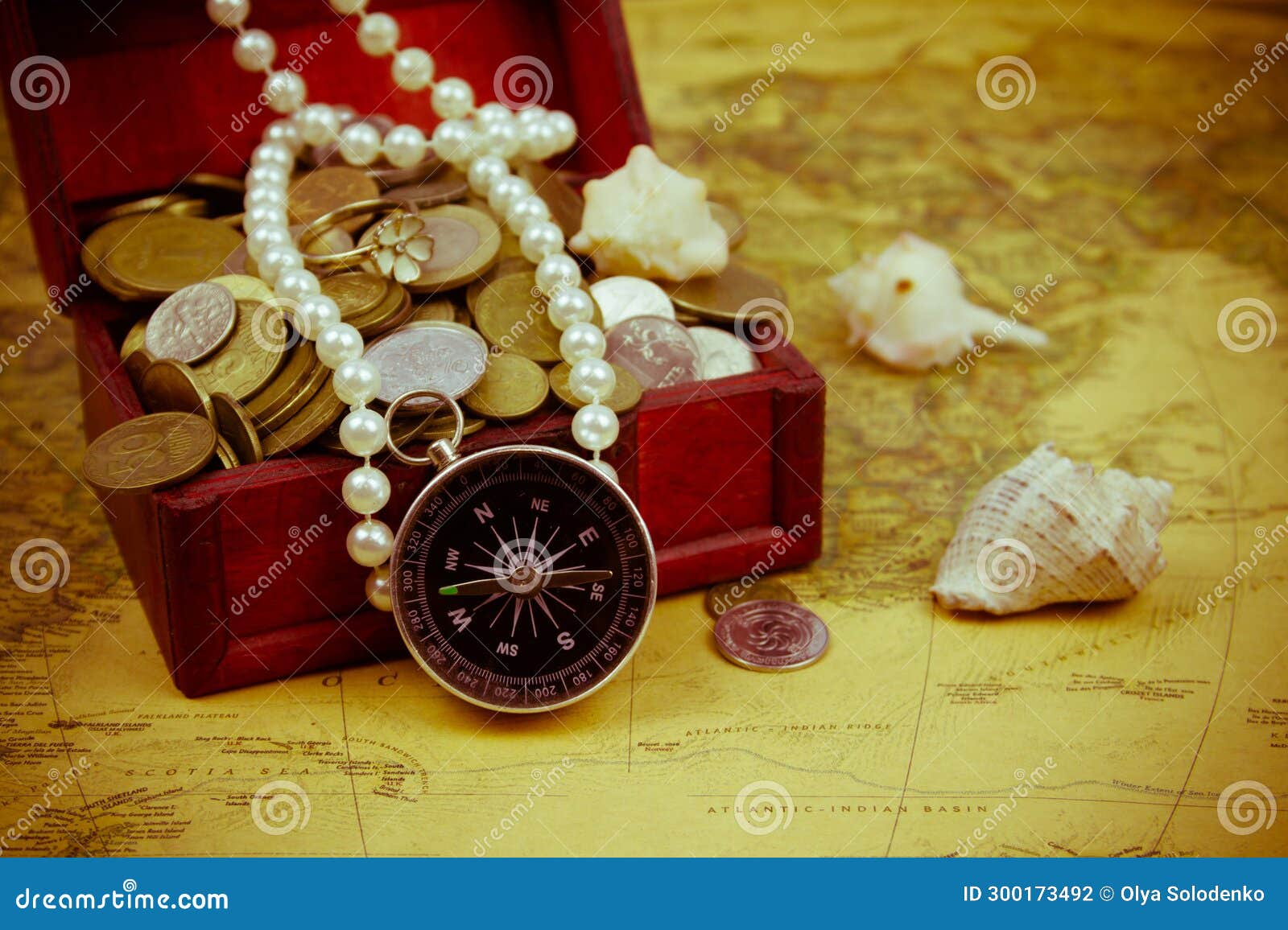 Treasure Chest with Jewelry and Coins, Compass and Shells on Vintage ...
