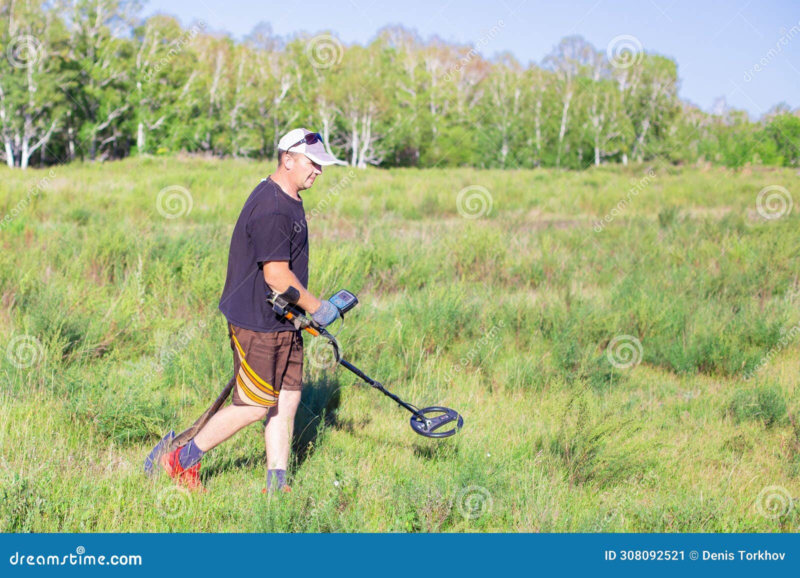 Treasure Hunter in the Field Looking for Old Coins and Artifacts Stock ...