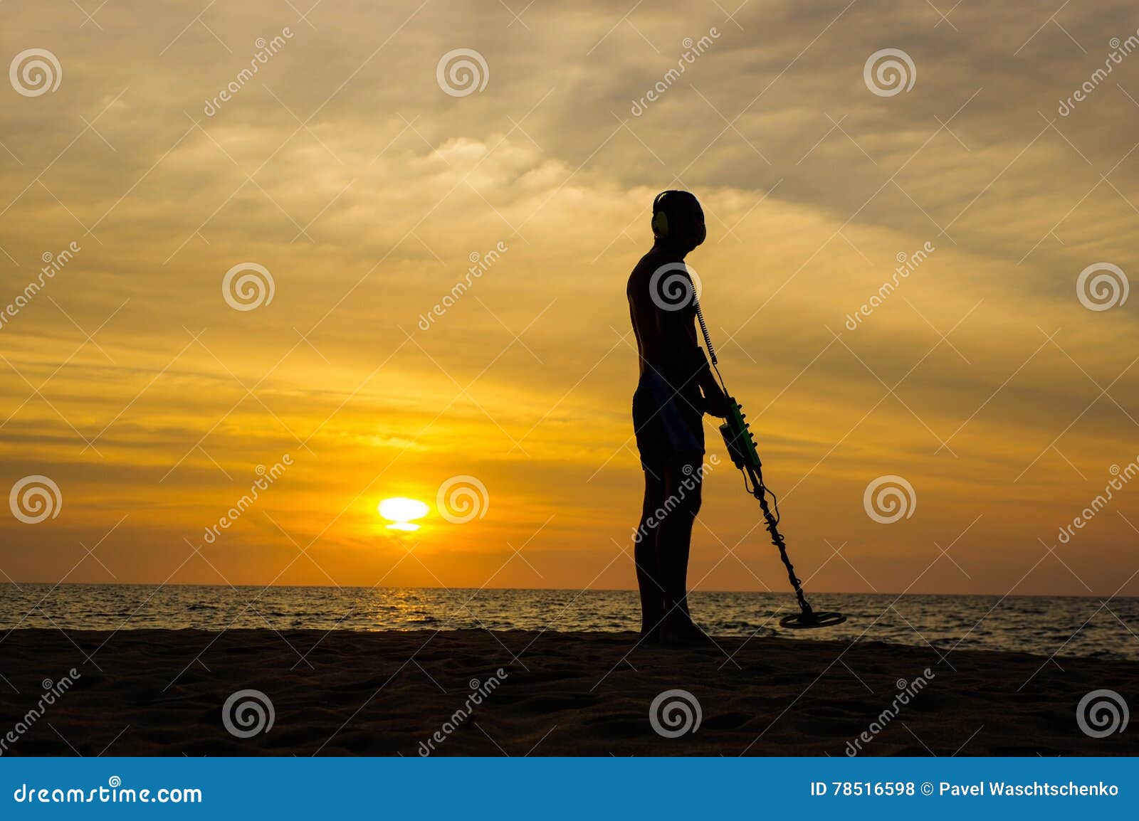 Treasure Hunter with Metal Detector on Sunset the Beach Stock Photo ...