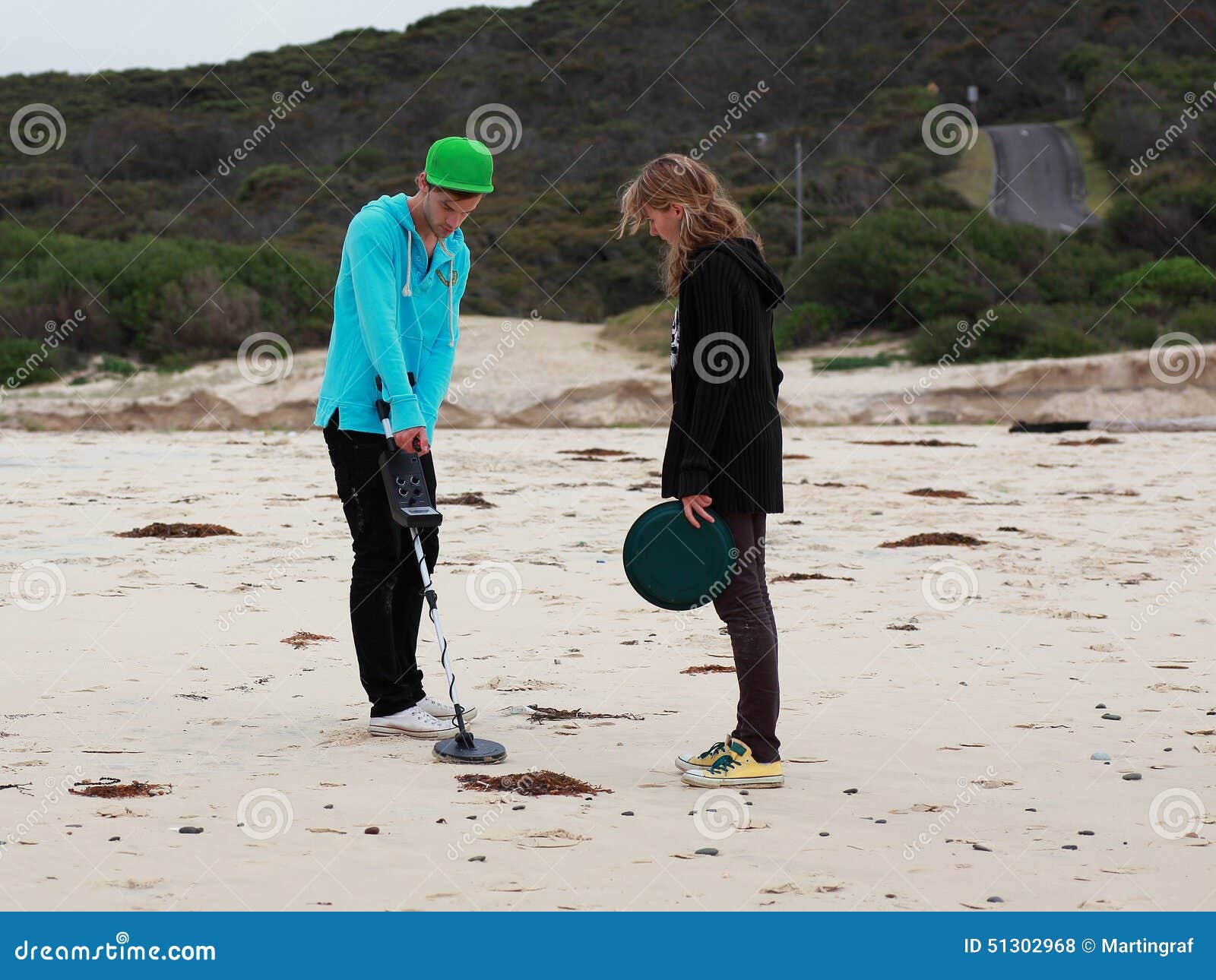 Friends on Treasure Hunt at Australian Beach Landscape Stock Photo ...