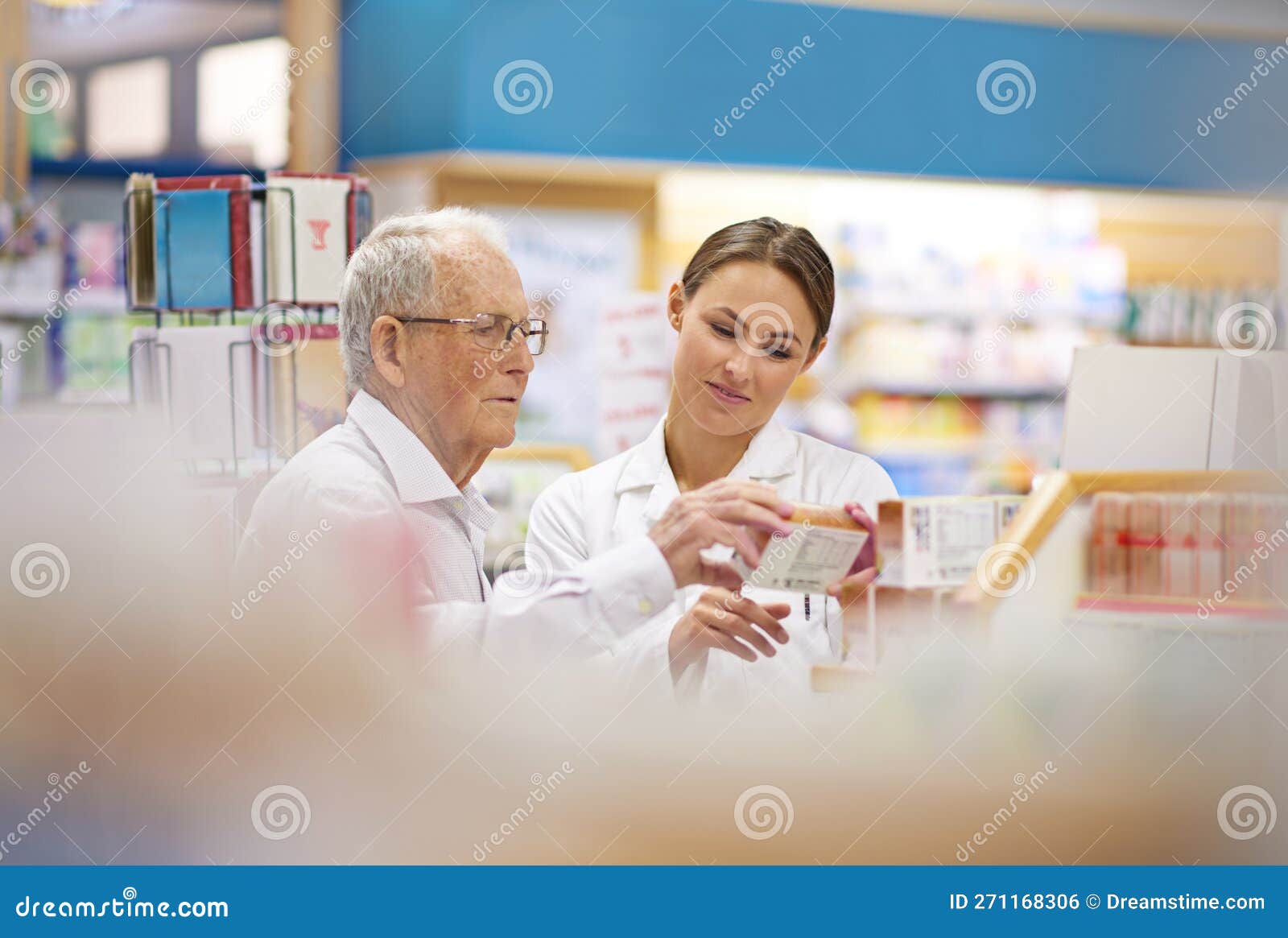 Treating Every Client As an Individual. a Young Pharmacist Helping an ...