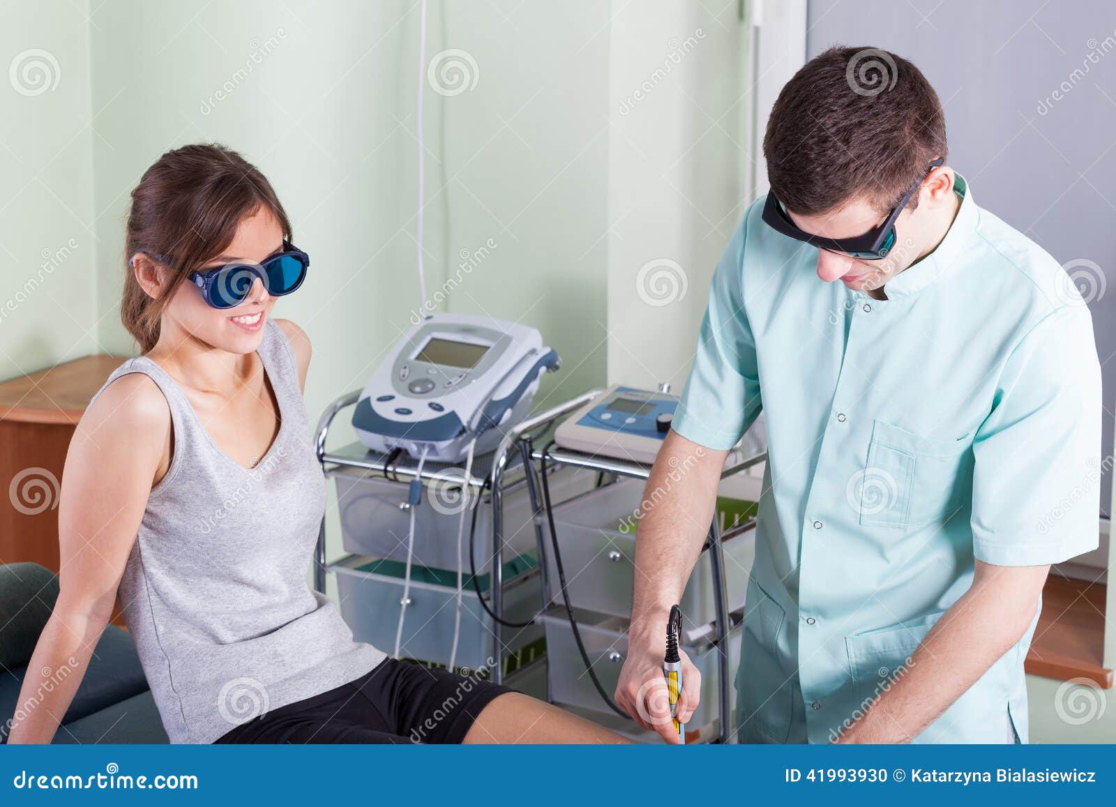 Treating Leg Using Laser Therapy Stock Photo - Image of helping ...