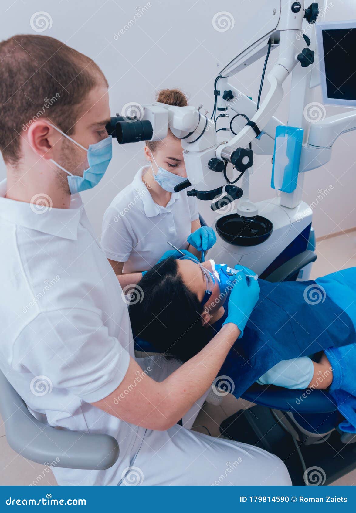 Treatment of Root Canals Under a Microscope, Work with an Assistant ...