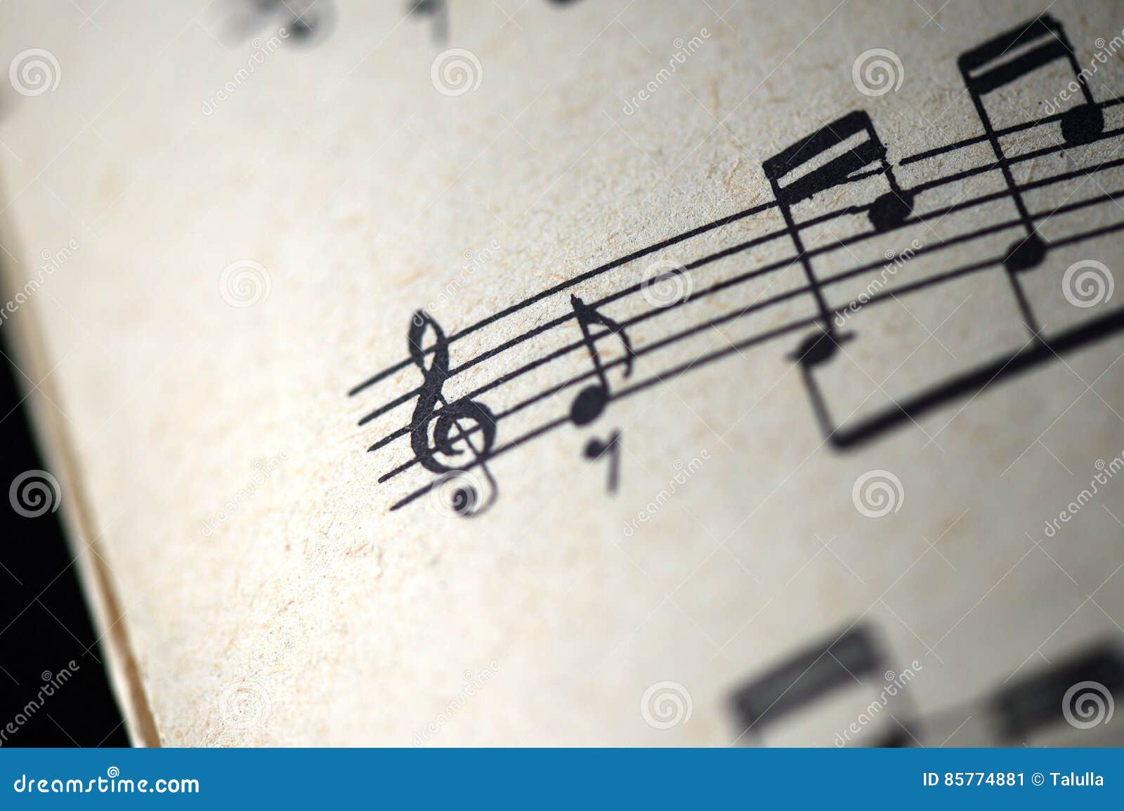 Treble Clef and Musical Notes in the Old Musical Notebook Stock Image ...