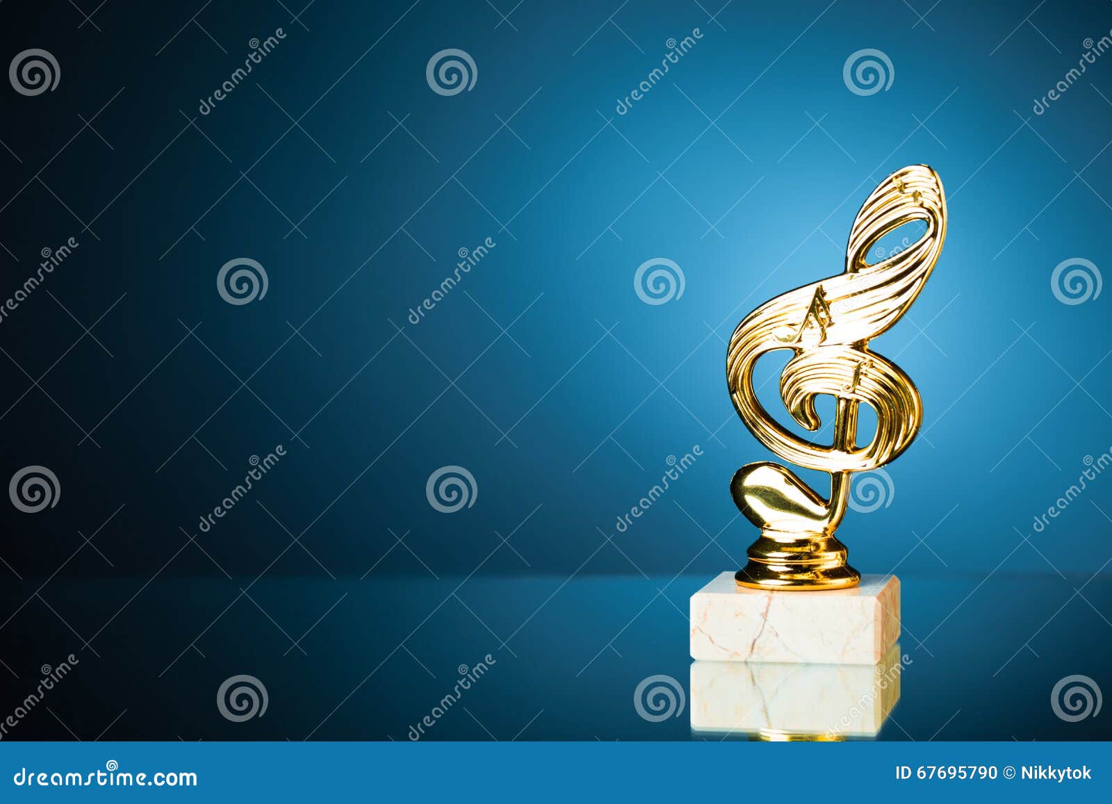 Treble Clef Symbol Trophy on Blue Background Stock Photo - Image of ...