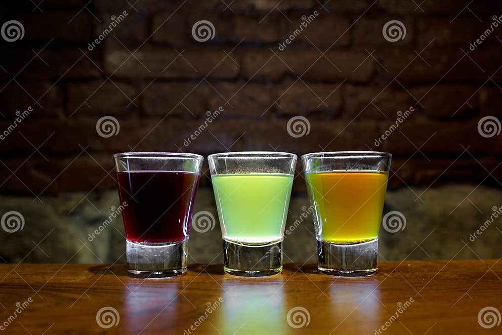 Tree Colored Shots on the Bar. Stock Photo - Image of color, liquor ...