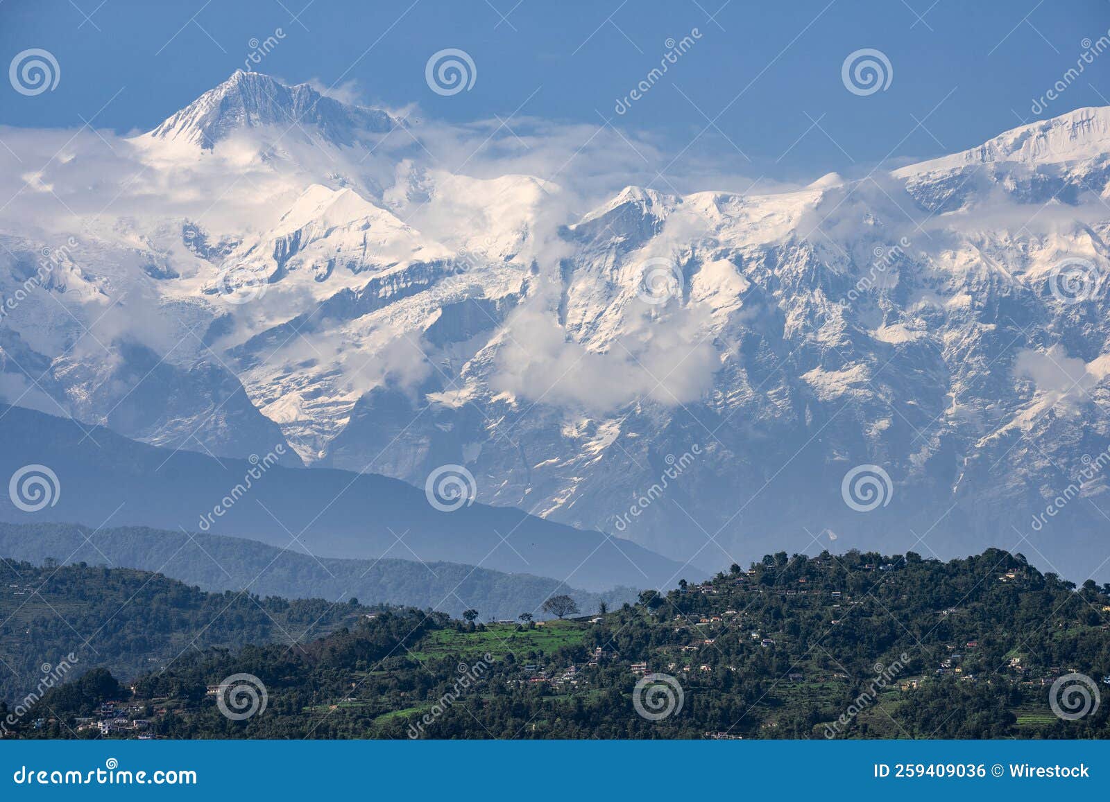 Tree-covered Hills before the Annapurna Himalayan Mountain Range in ...