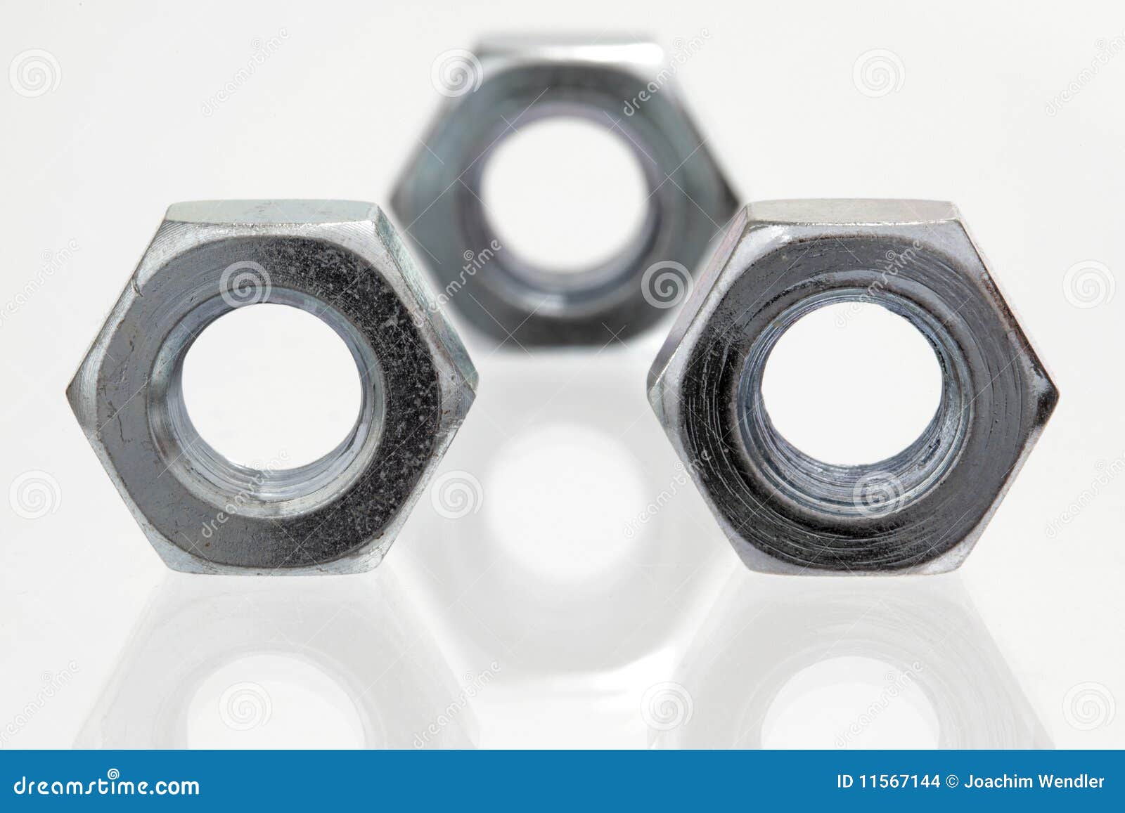 Tree metal nuts, closeup stock photo. Image of silver - 11567144