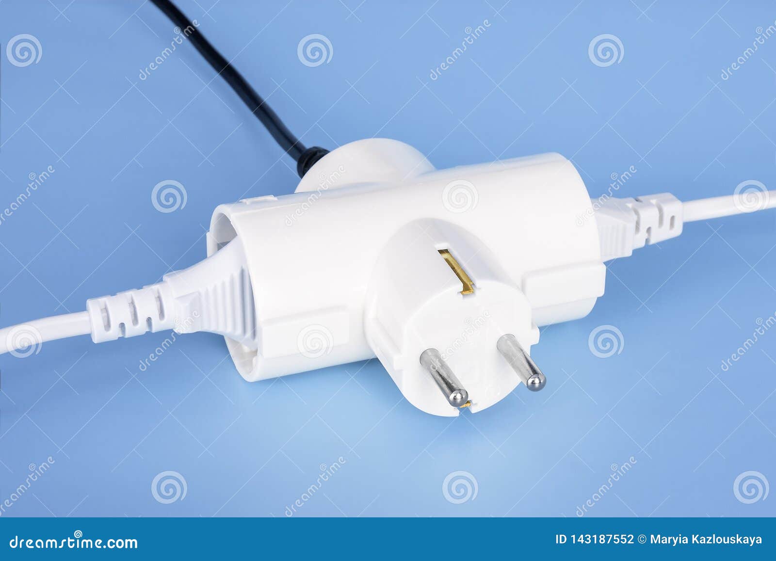 Tree Plugs Socketed Into White Electric Splitter On A White Background ...
