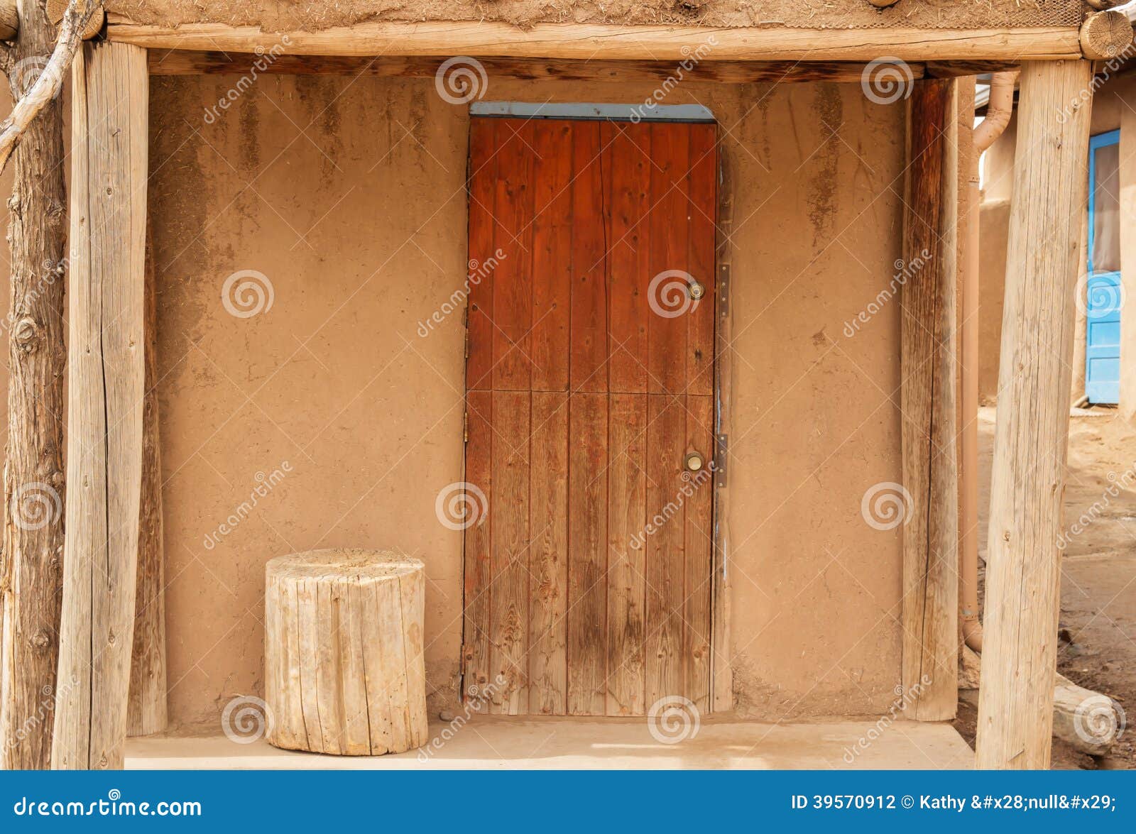 Tree stump beside a door stock photo. Image of stump - 39570912