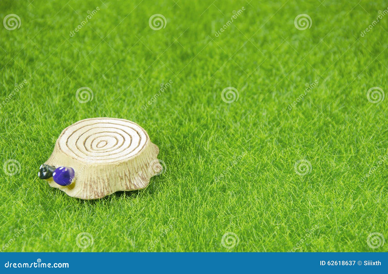 Tree stump toy on a grass stock image. Image of brown - 62618637