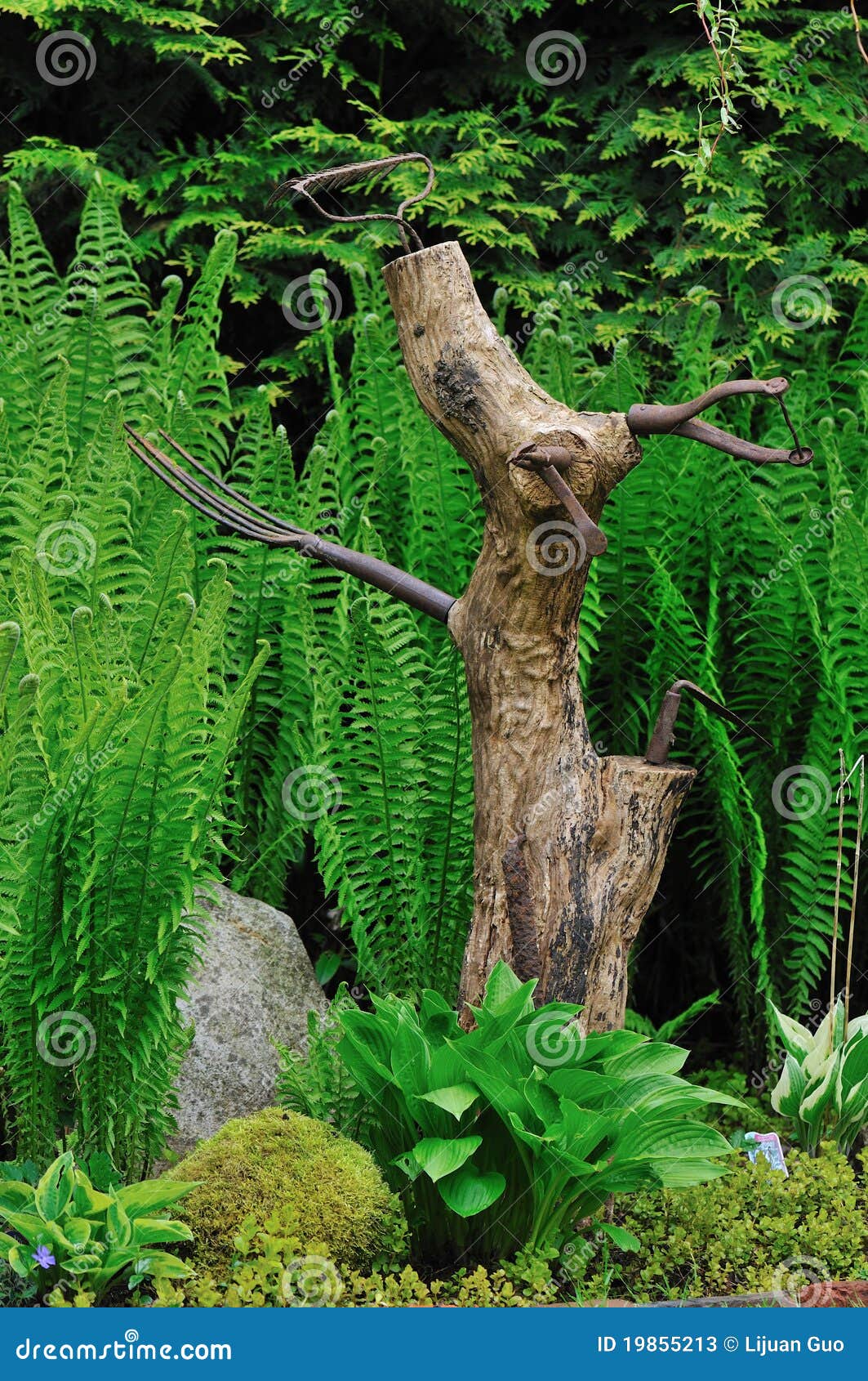 Tree Trunk Dog Sculpture in the Shade Garden Stock Image - Image of ...