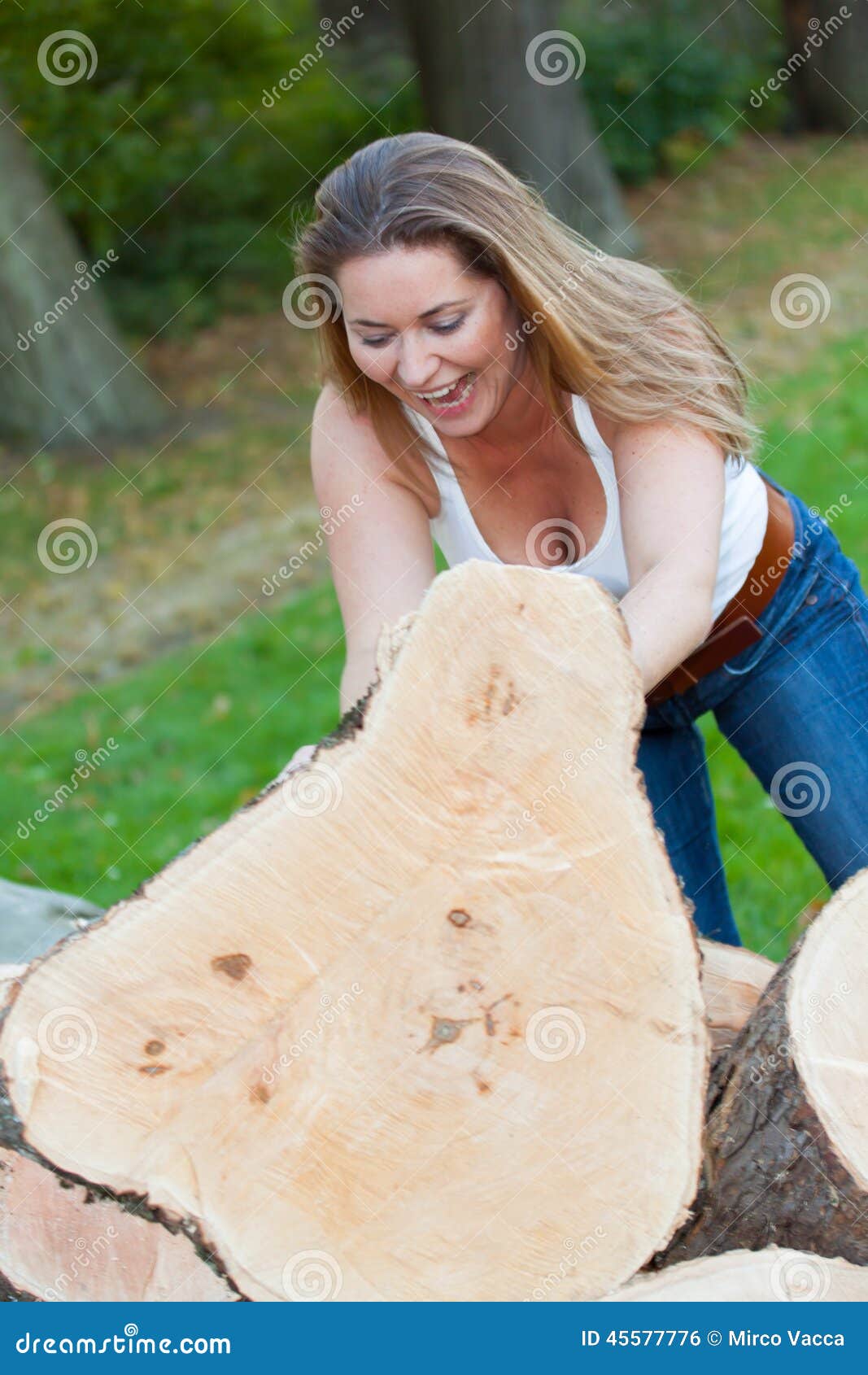 Tree trunks woman stock photo. Image of trunk, smile - 45577776