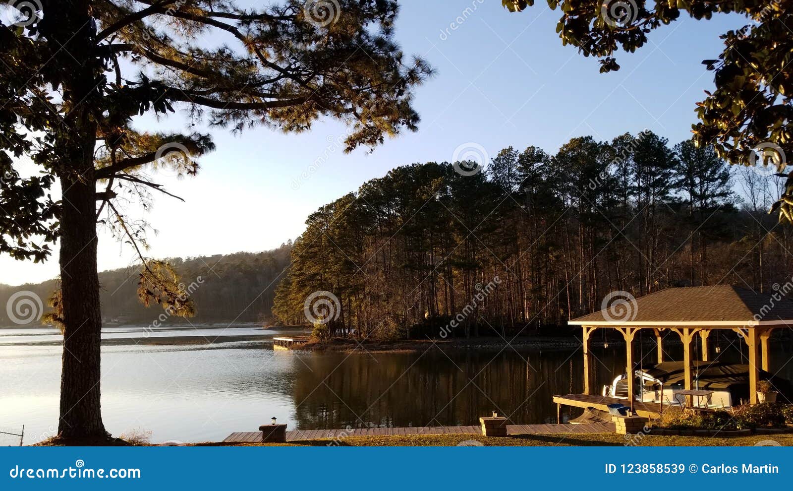 Lakeside sunset stock image. Image of calm, serene, spirit - 123858539