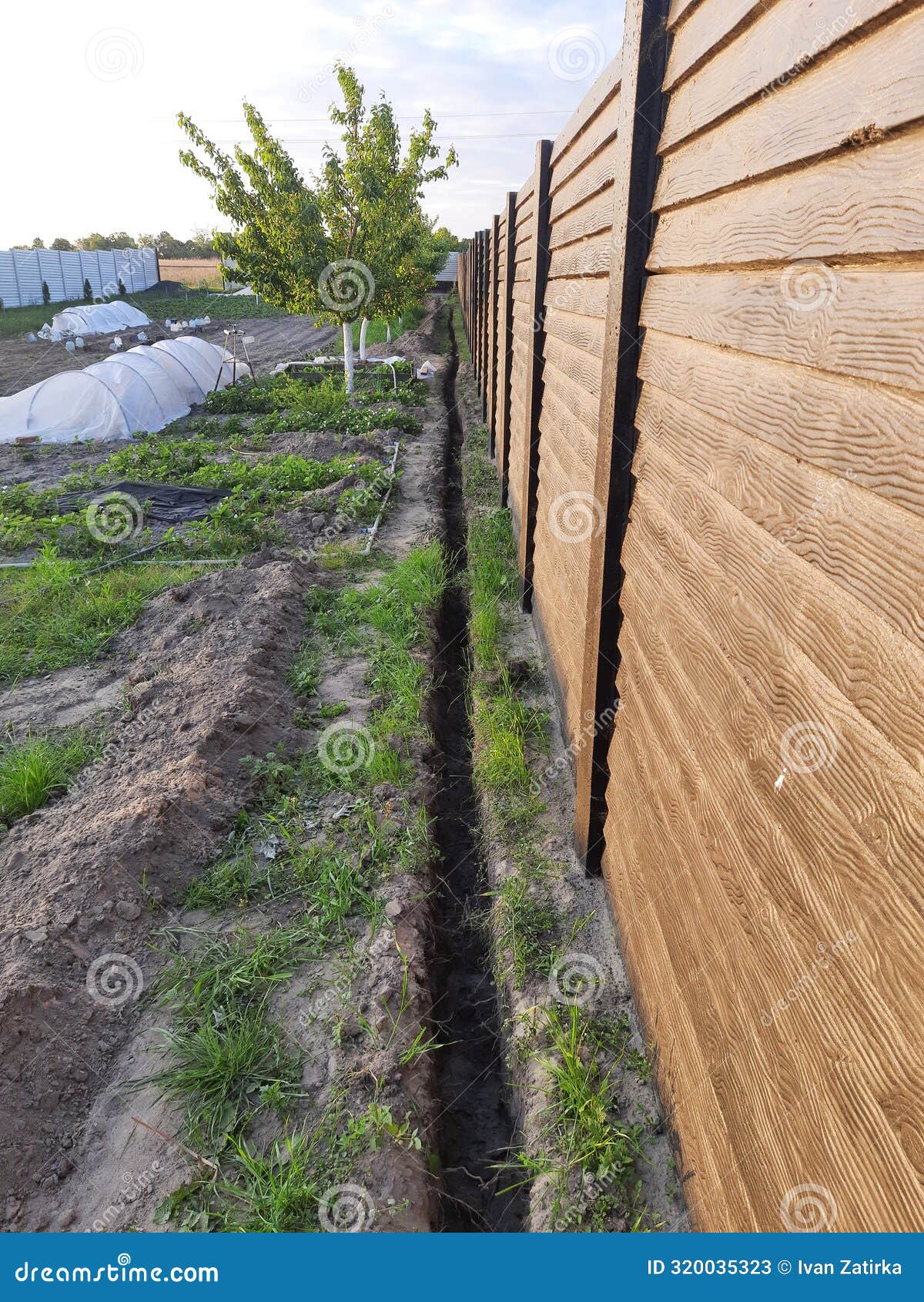 A Trench Dug in the Ground for Laying Irrigation. Stock Image - Image ...