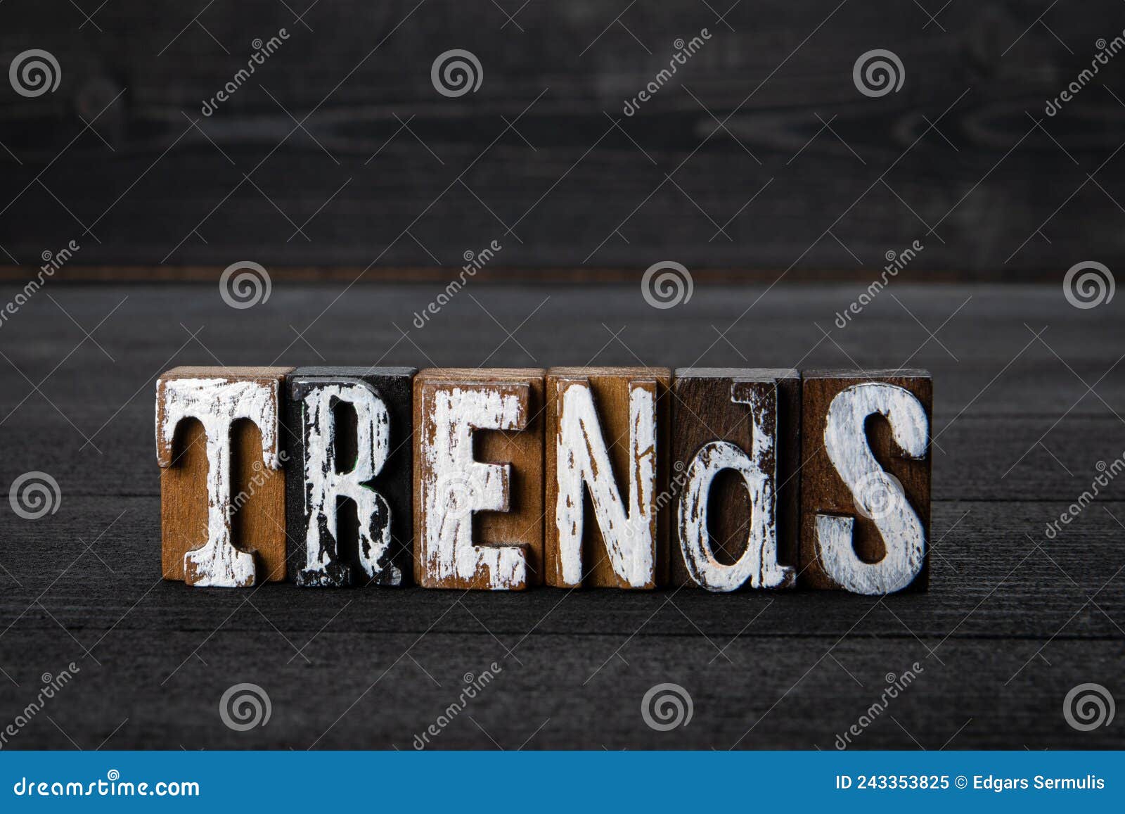 Trends. Text from Wooden Alphabet Blocks on a Dark Textured Background ...