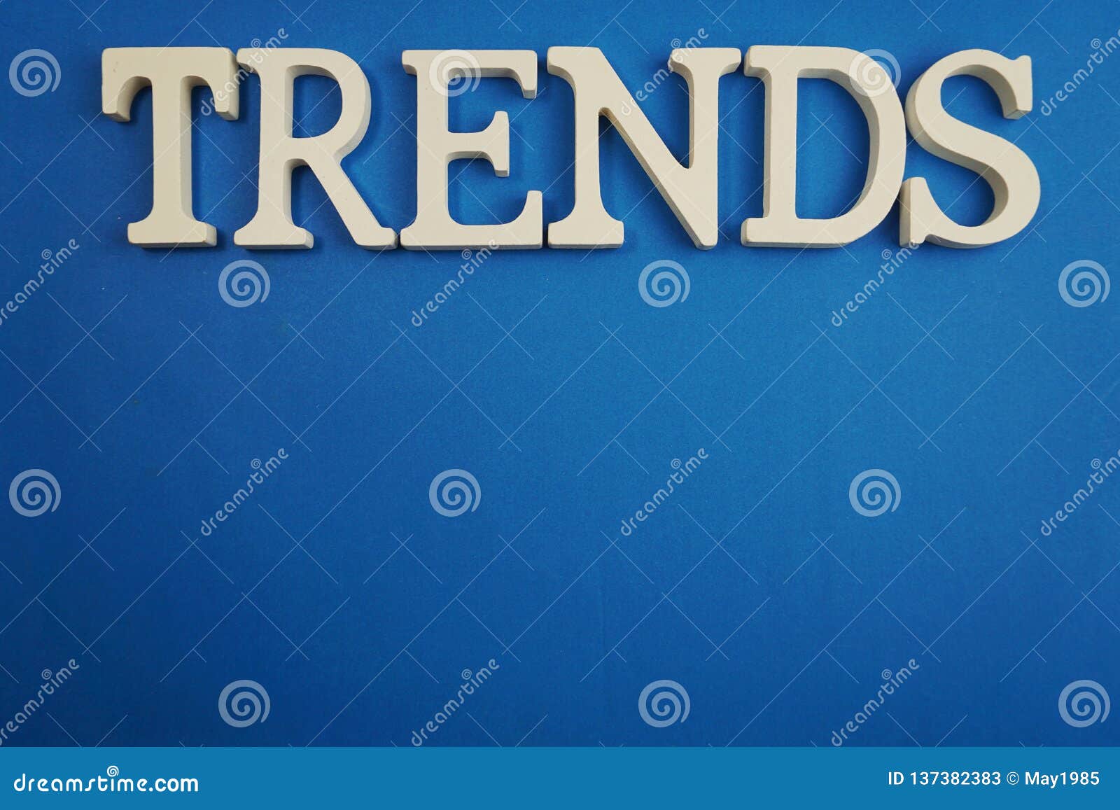 Trends Word Alphabet Letters on Blue Background Stock Image - Image of ...