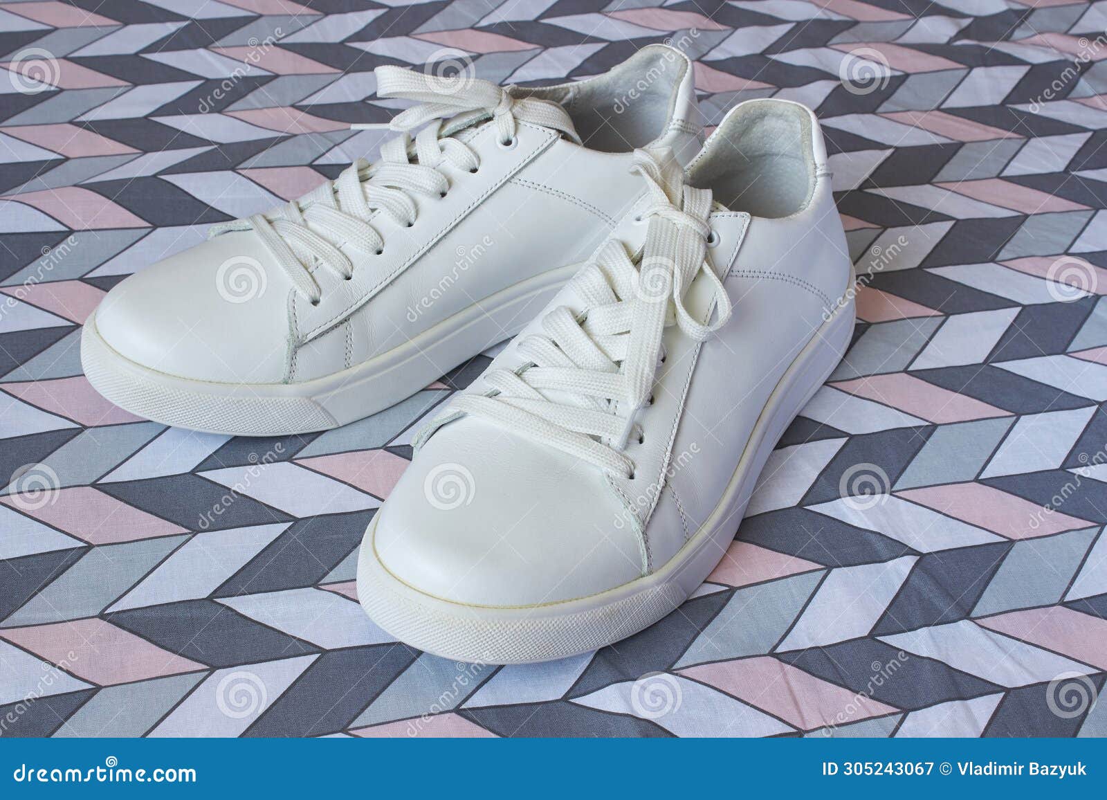 Trendy Cheap White Sneakers, a Pair of White Sneakers on a Background ...