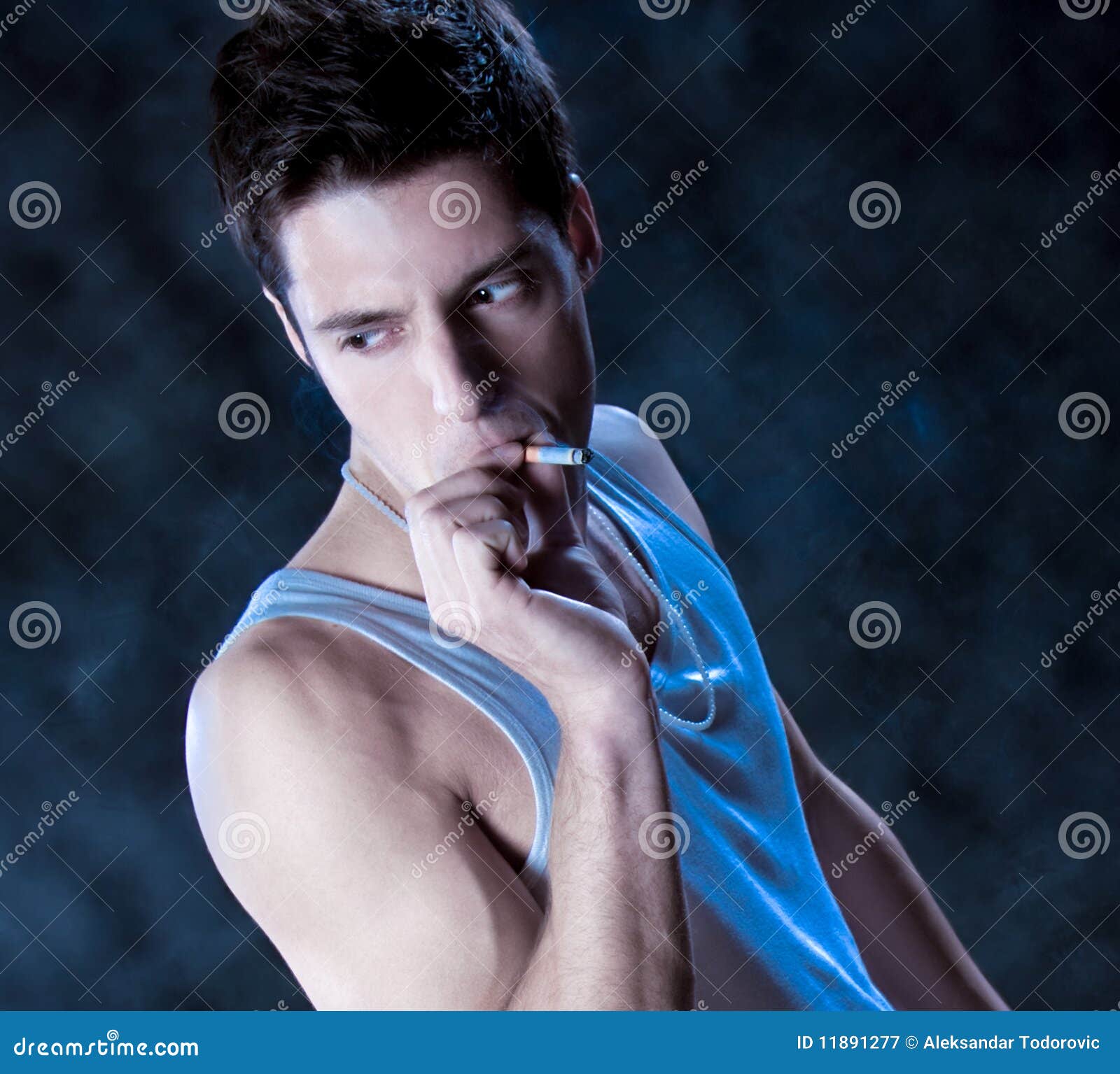 A Trendy Cute Guy Who is Smoking Stock Image - Image of looking ...