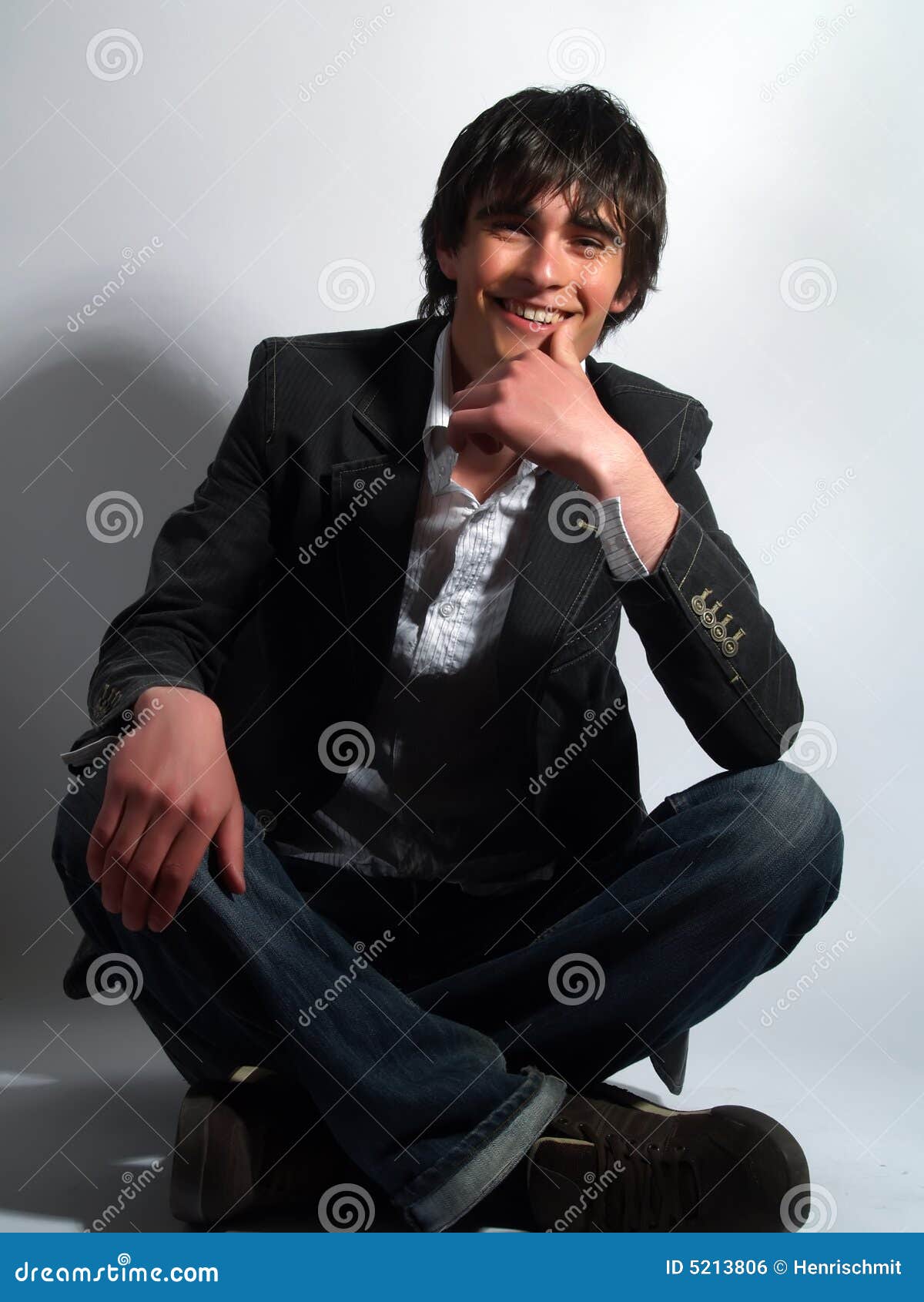 Trendy guy is smiling stock photo. Image of glamorous - 5213806