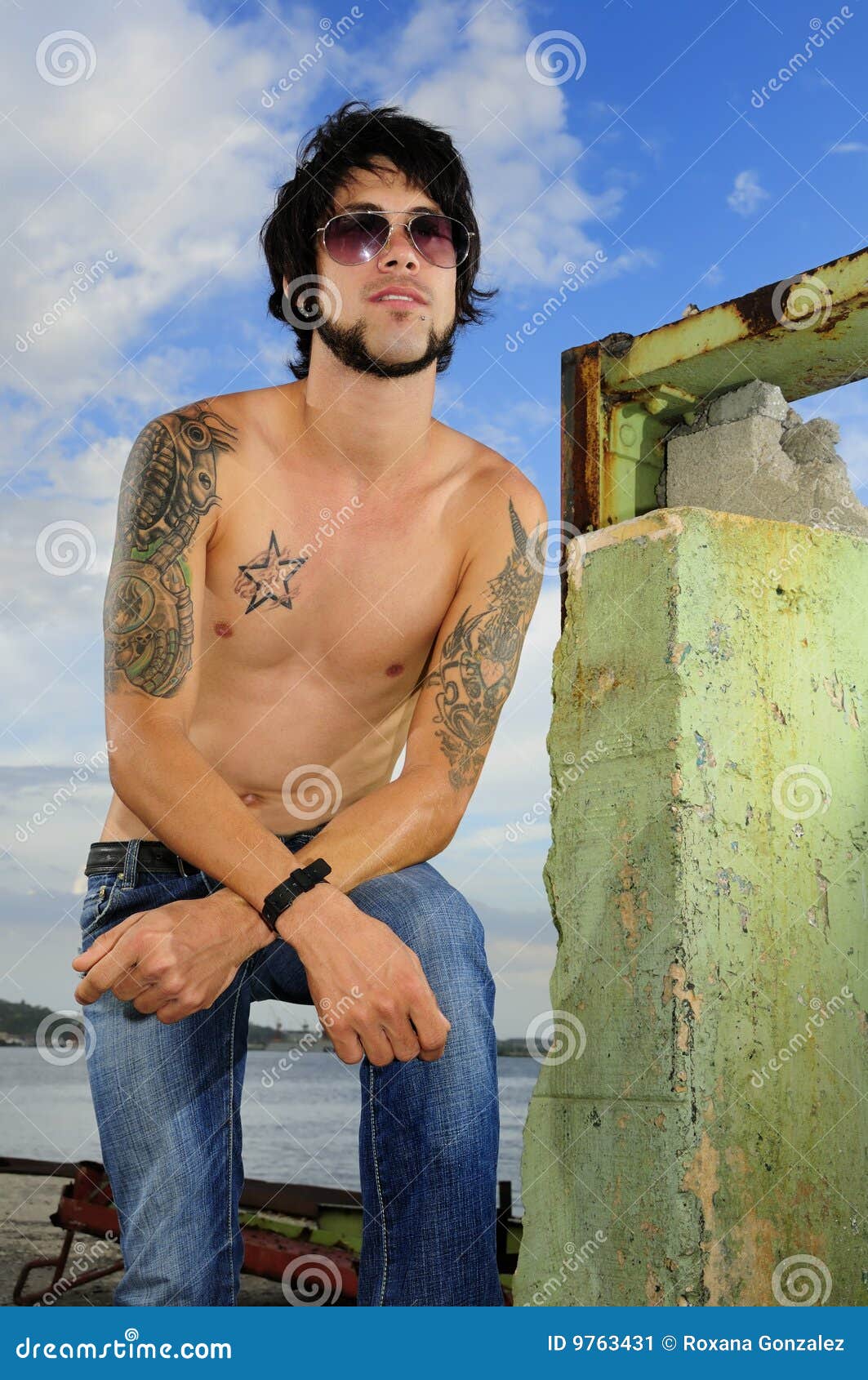 Trendy guy with tattoos stock image. Image of cute, model - 9763431