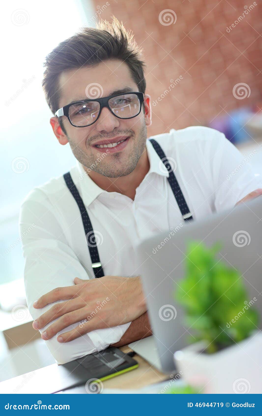 Trendy guy at work stock image. Image of communication - 46944719