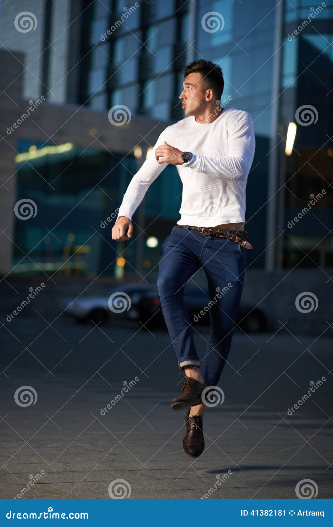 Trendy Handsome Guy Jumping Late for Stock Image - Image of late ...