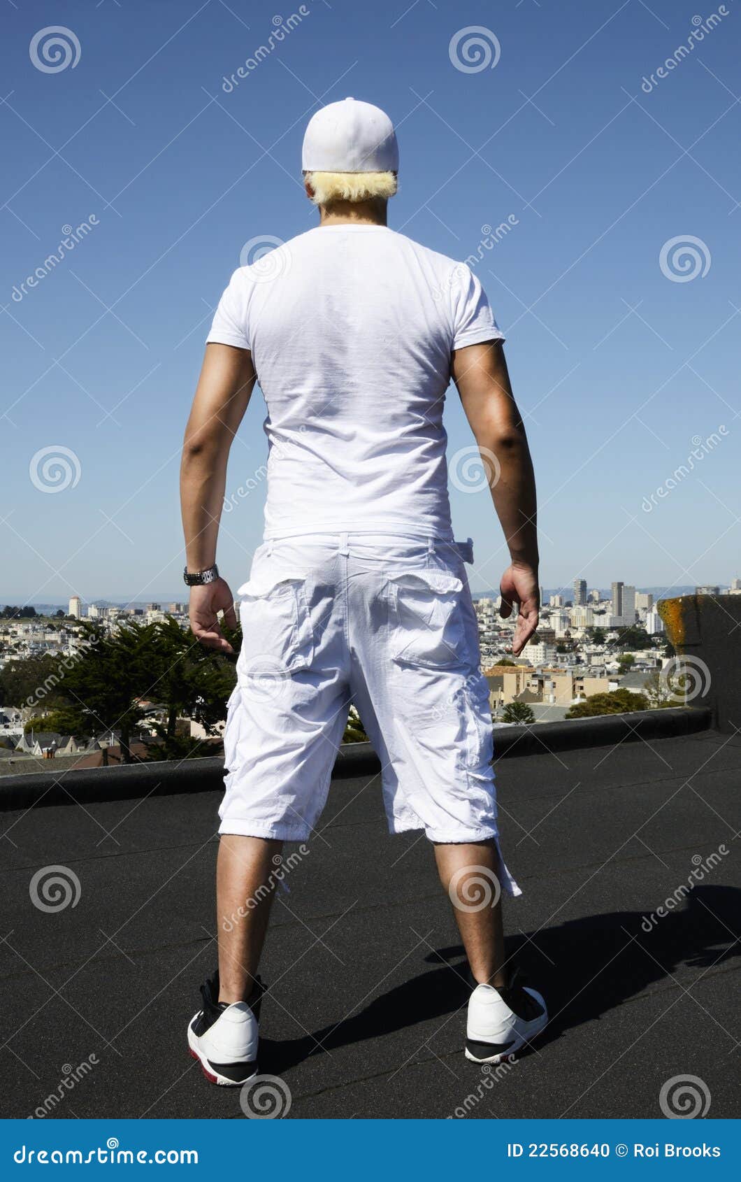 Trendy man from the back stock photo. Image of shorts - 22568640