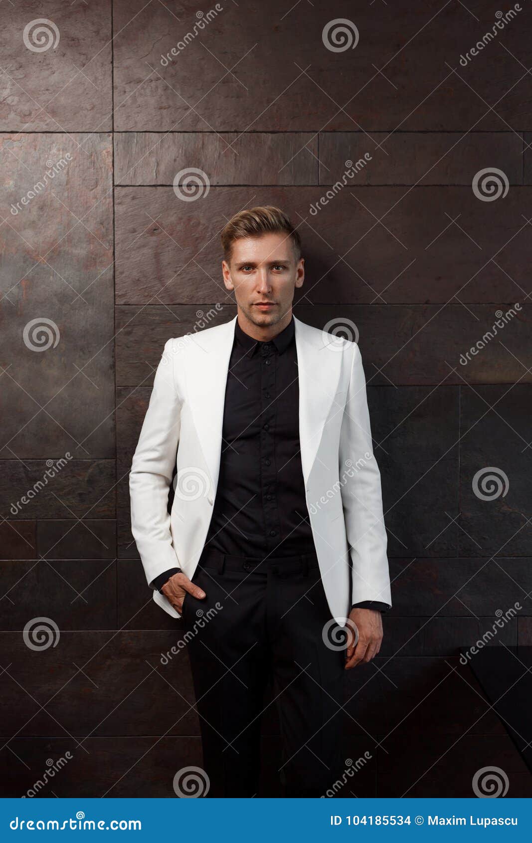 Trendy man in elegant suit stock photo. Image of adult - 104185534