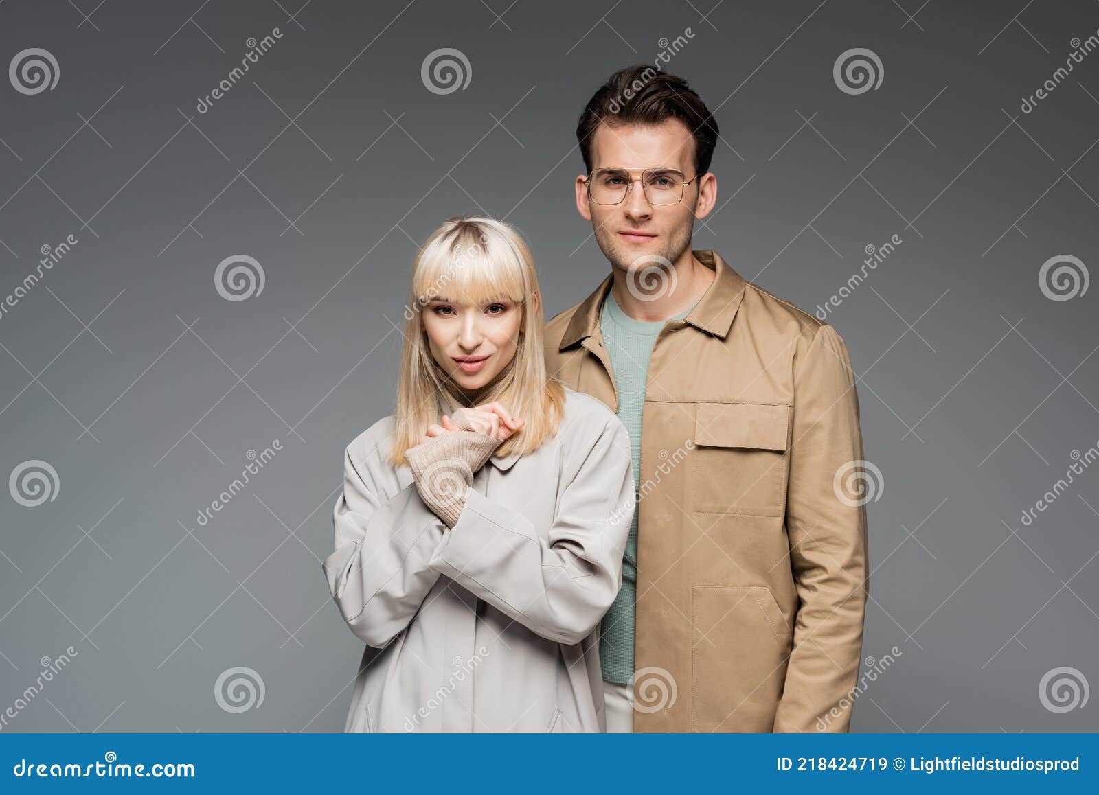 Trendy Models Posing while Looking at Stock Image - Image of clothes ...