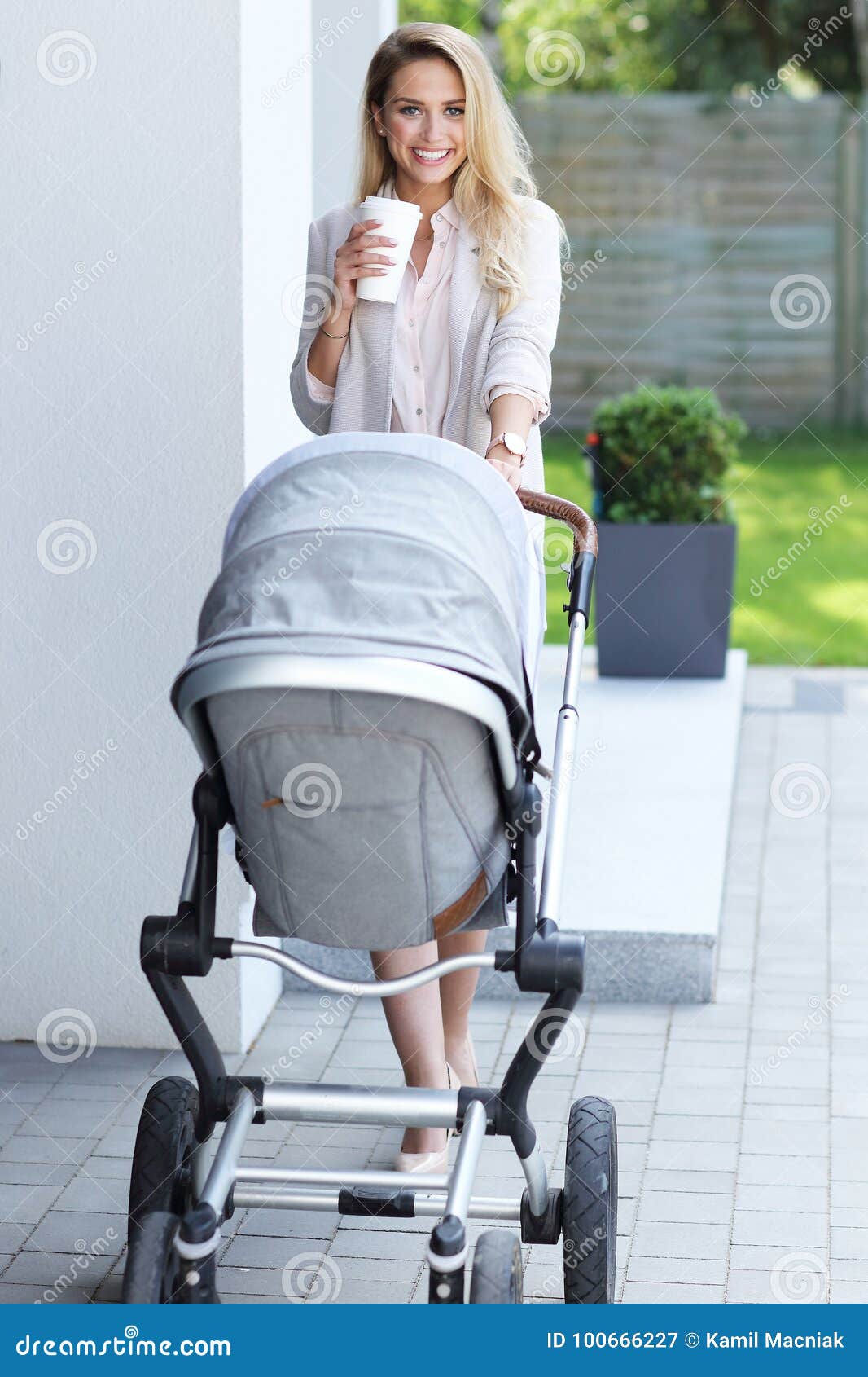 Trendy Modern Mother Outside with a Stroller Stock Image - Image of ...