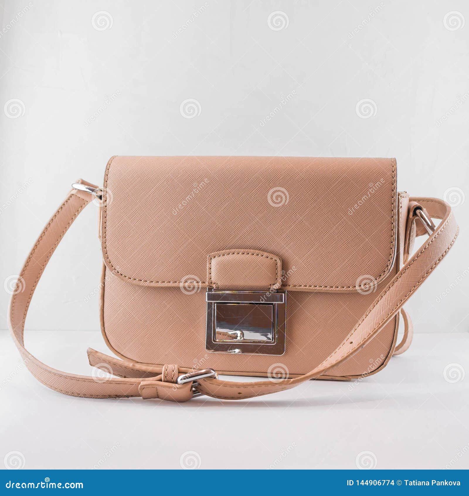 Trendy Small Woman Bag with a Long Shoulder Strap Stock Photo - Image ...