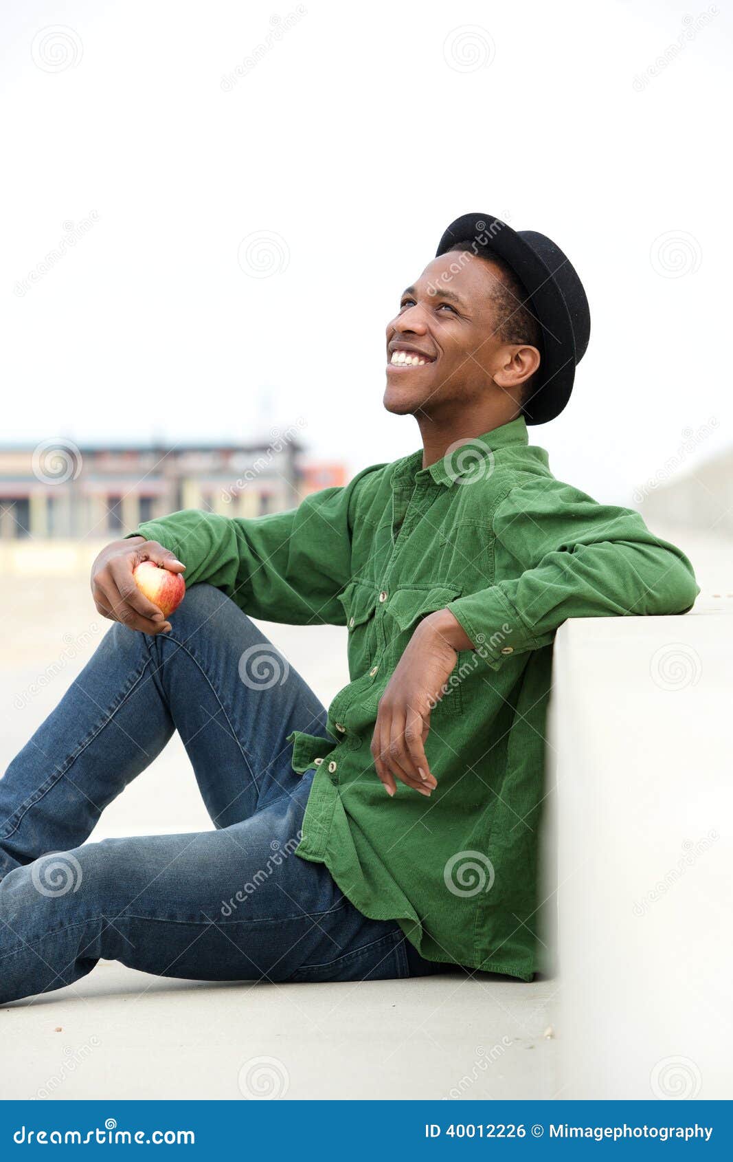 Trendy Young Man with Apple Stock Photo - Image of casual, american ...