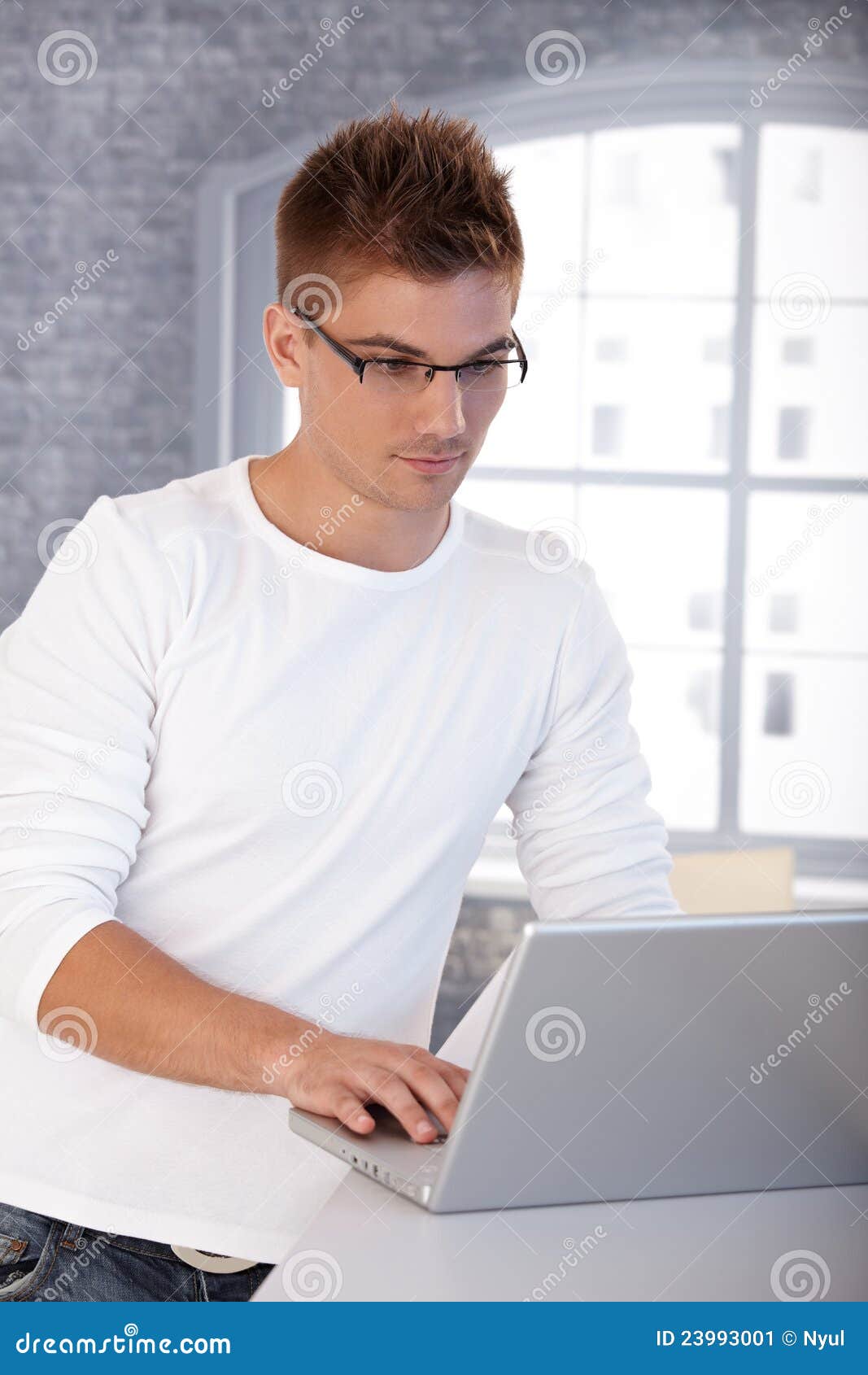 Trendy Young Man with Laptop Stock Image - Image of indoor, american ...