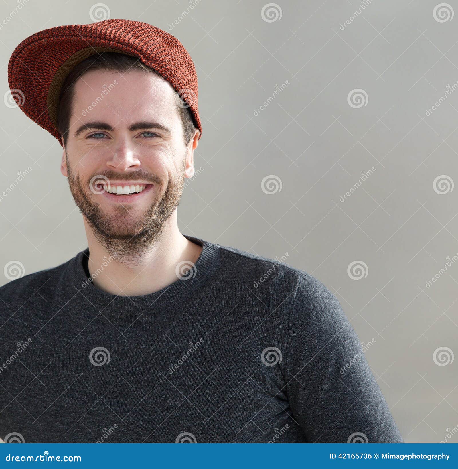 Trendy Young Man Smiling with Hat Stock Photo - Image of outdoors ...